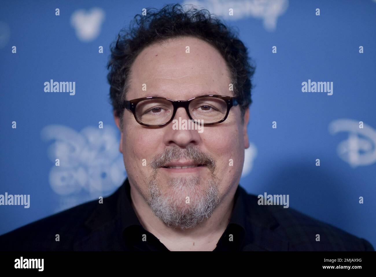 Jon Favreau attends the Disney+ press line at the 2019 D23 Expo on ...