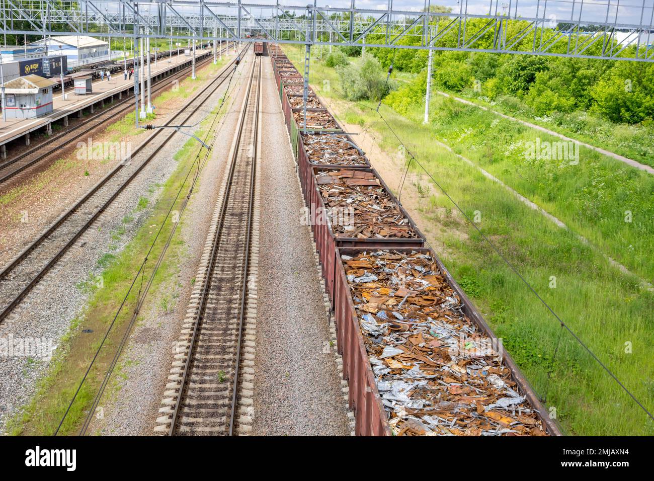 Transportation of scrap metal by rail. Scrap metal in railway wagons ...