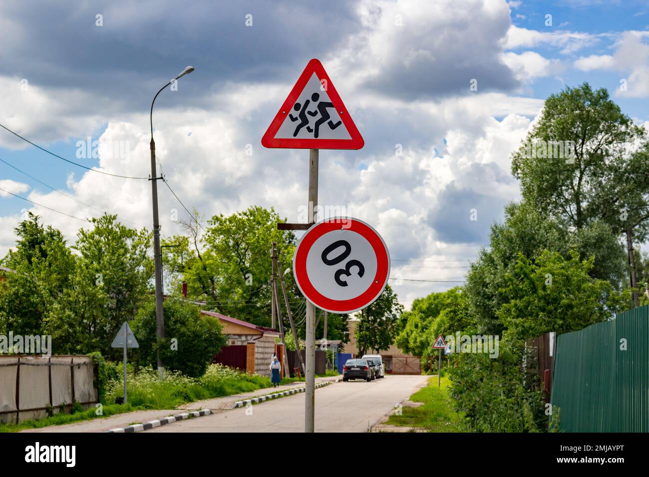 Broken sign of speed limit. Sign of approach to the pedestrian crossing ...