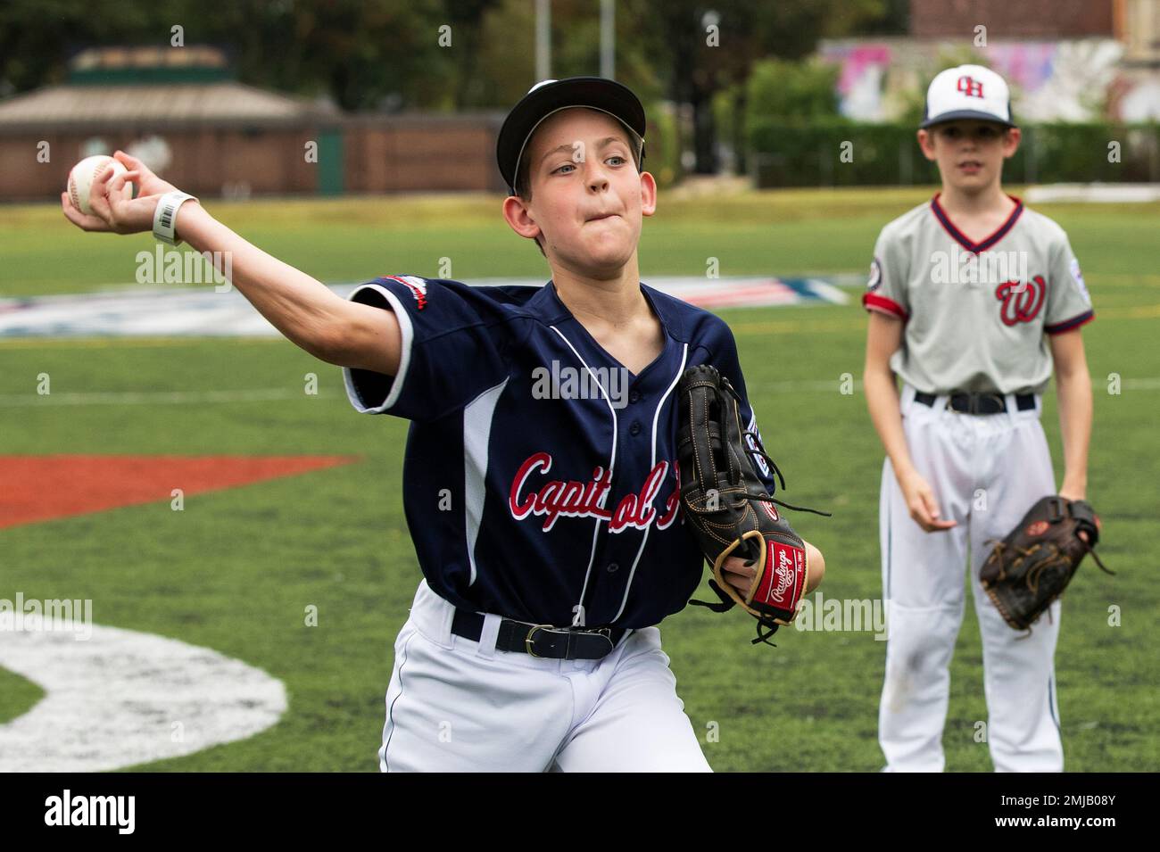 Dewey Fox, left, and his younger brother Jimmy Fox practice baseball ...