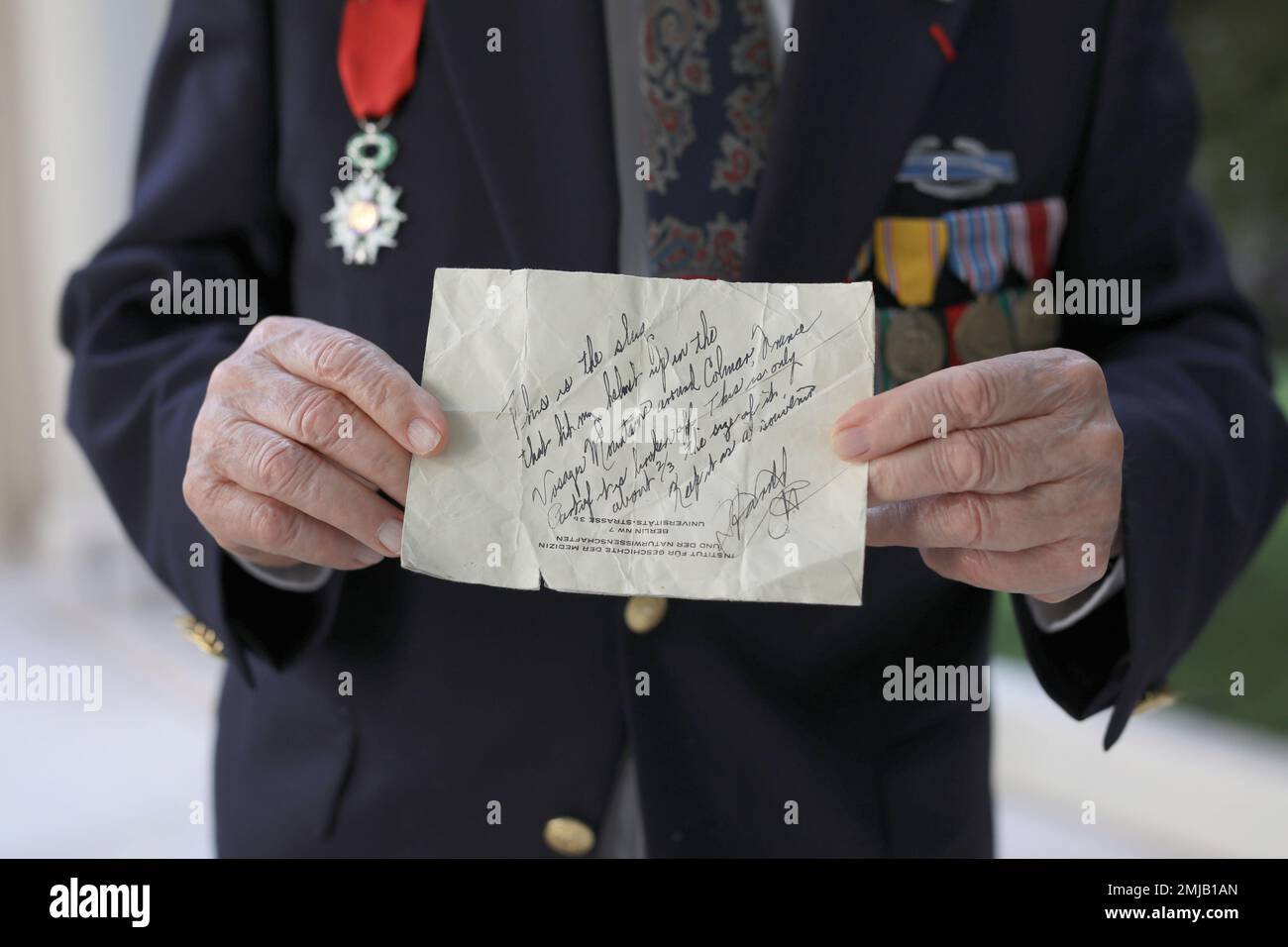 Harold Angle, 96, from the 112th infantry regiment 28th division, shows ...