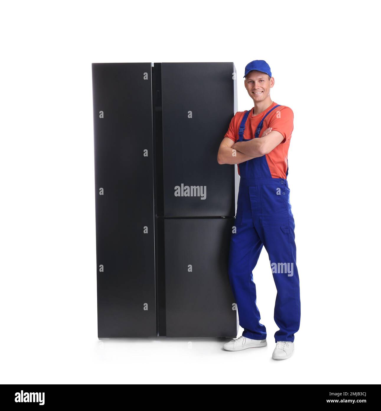 Smiling male technician repairing Cut Out Stock Images & Pictures - Alamy