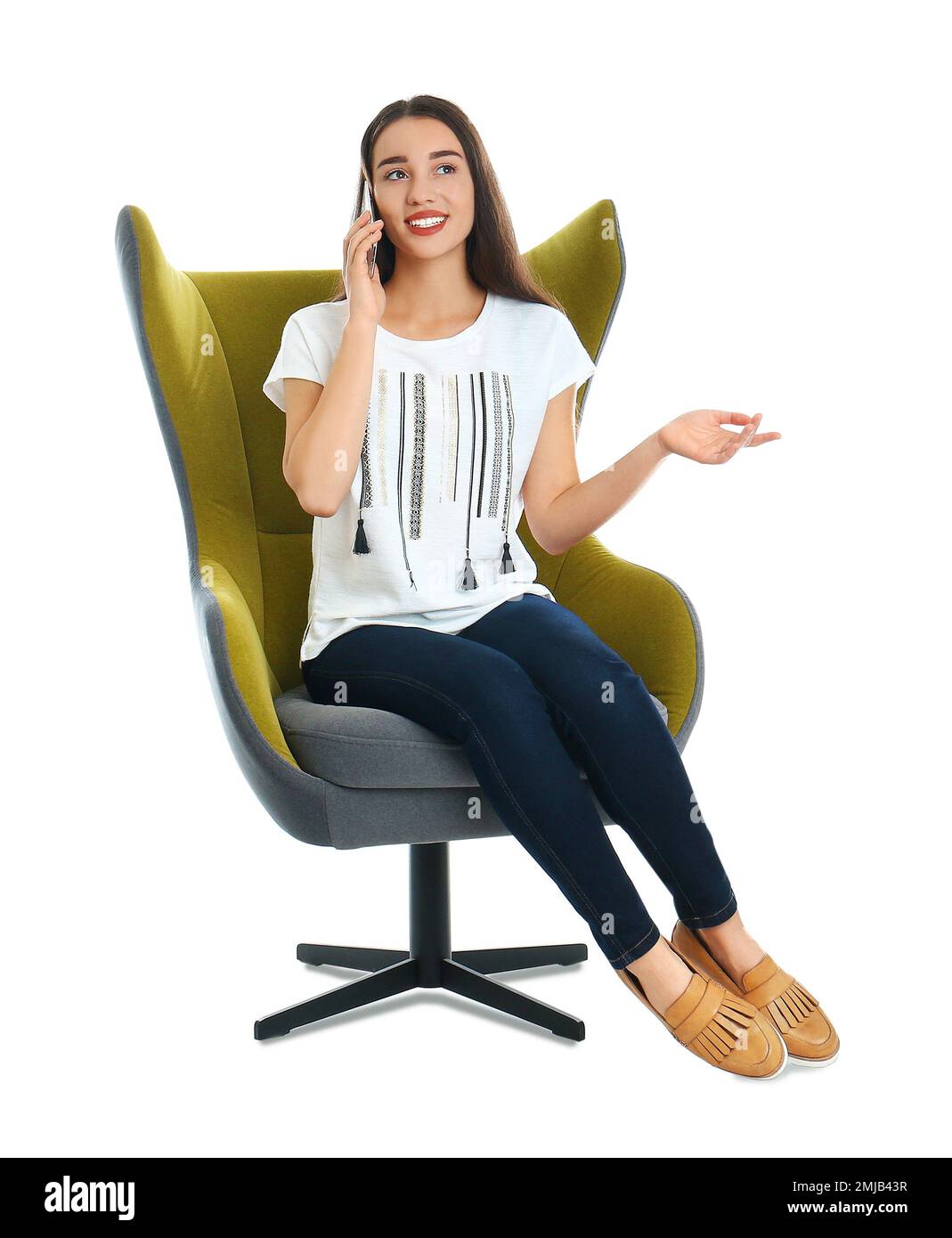 Happy young woman smartphone home Cut Out Stock Images & Pictures - Alamy