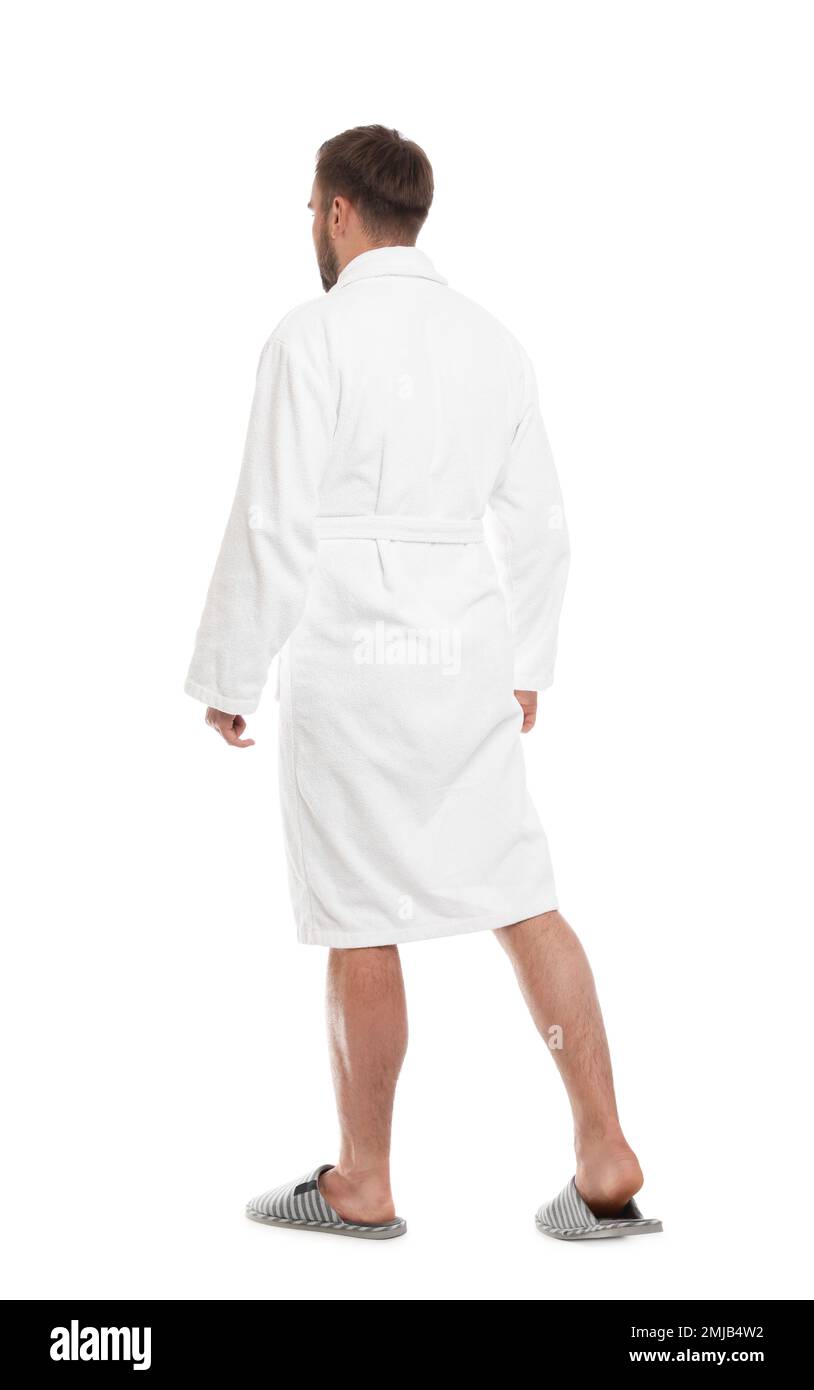 Man wearing bathrobe and slippers on white background Stock Photo - Alamy