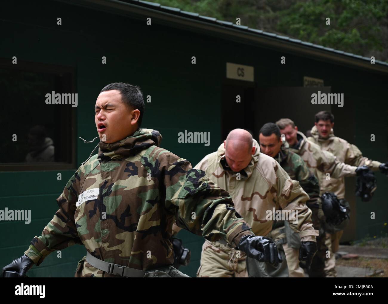 U.S. Air Force Airmen with the 627th Civil Engineer Squadron exit the ...