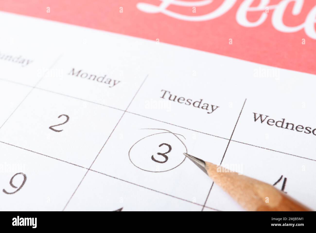 Pencil on calendar page with marked date, closeup Stock Photo - Alamy