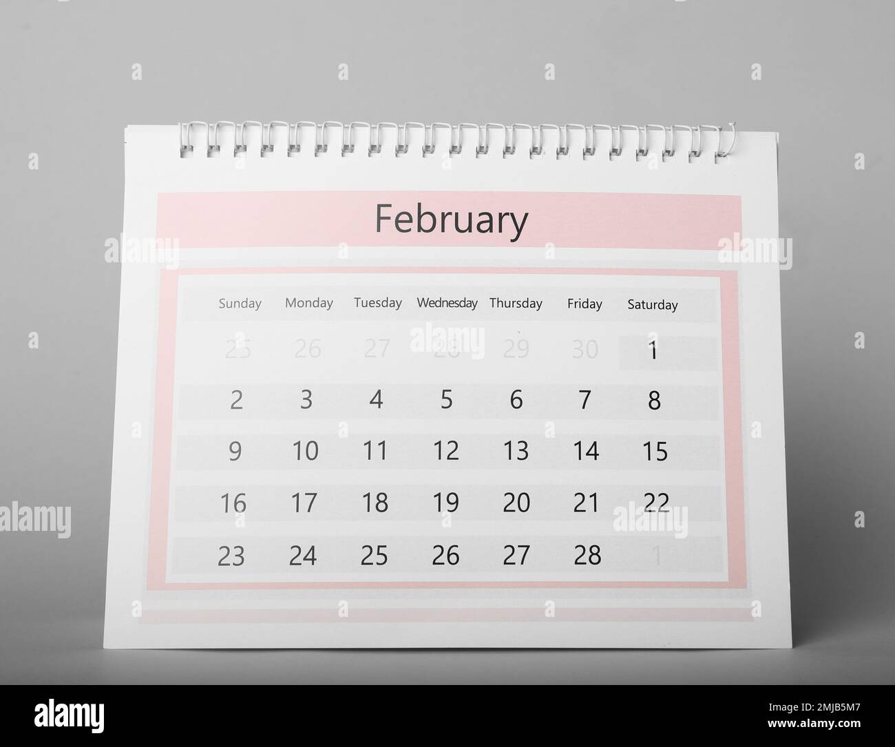 Paper calendar on grey background. Planning concept Stock Photo - Alamy