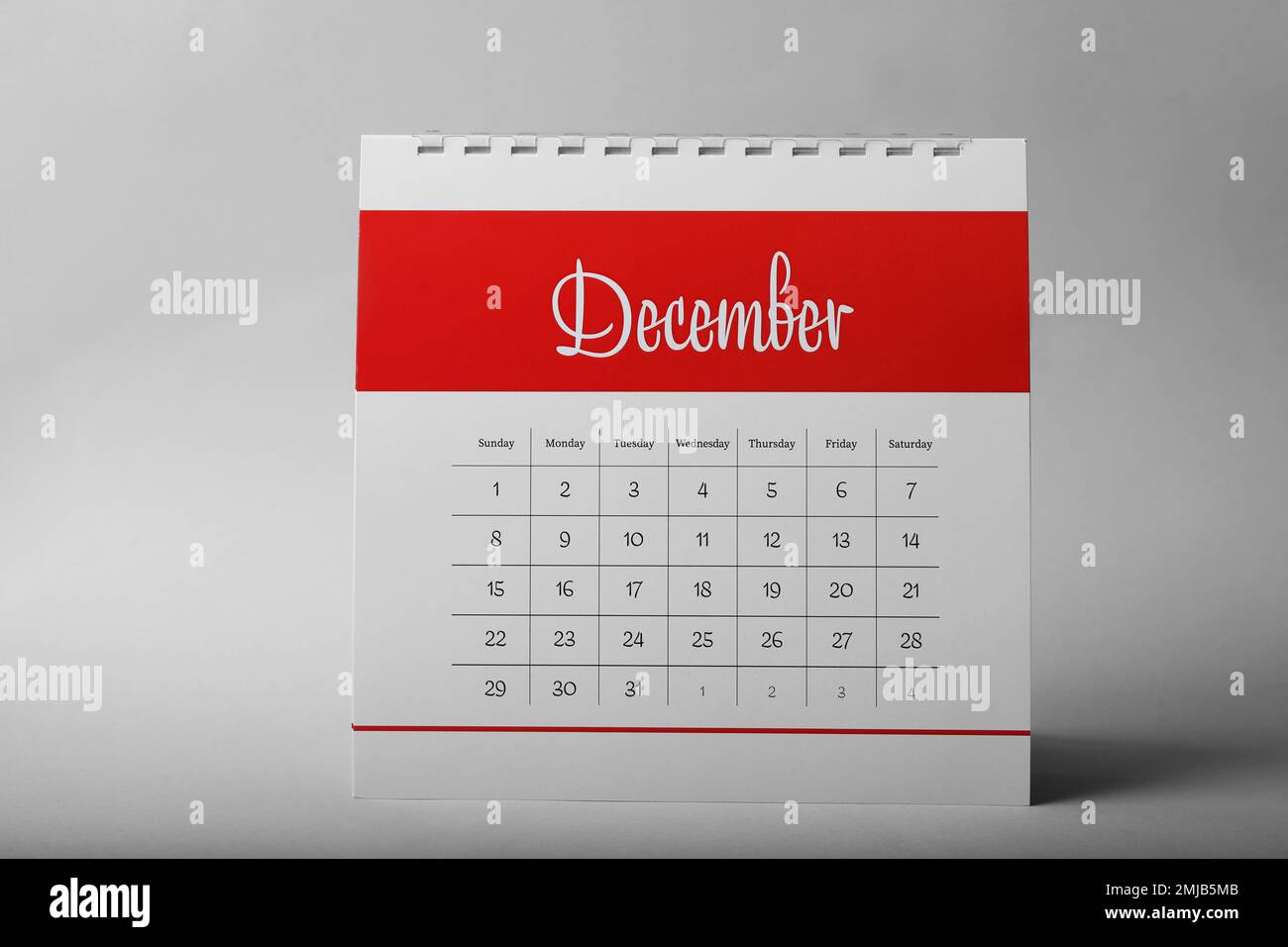 Paper calendar on grey background. Planning concept Stock Photo - Alamy