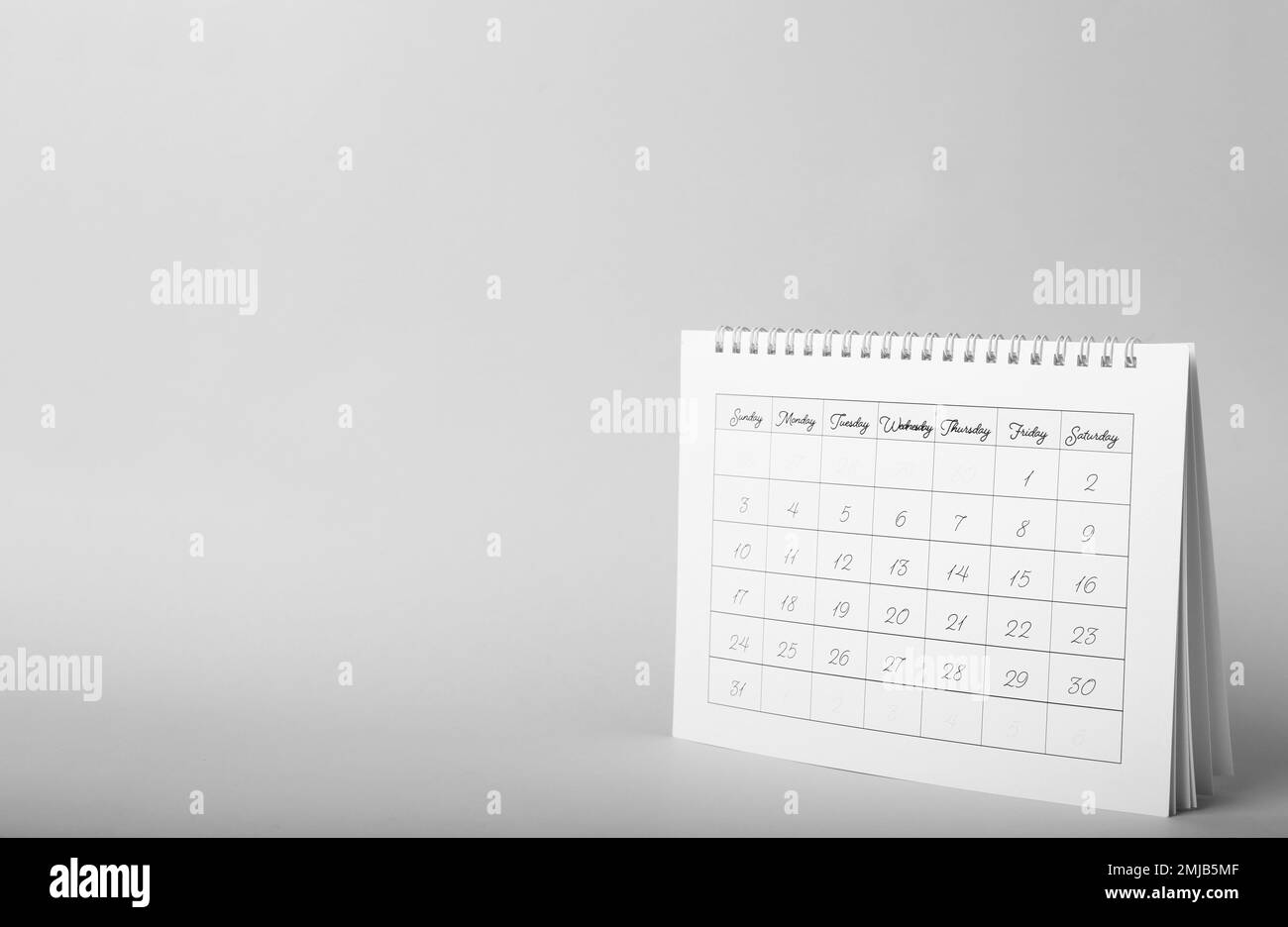 Paper calendar on grey background, space for text. Planning concept ...