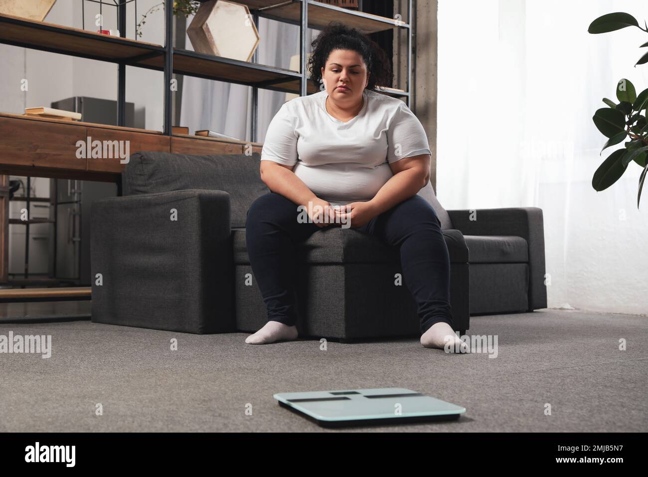 Frustrated overweight woman in hi-res stock photography and images - Alamy