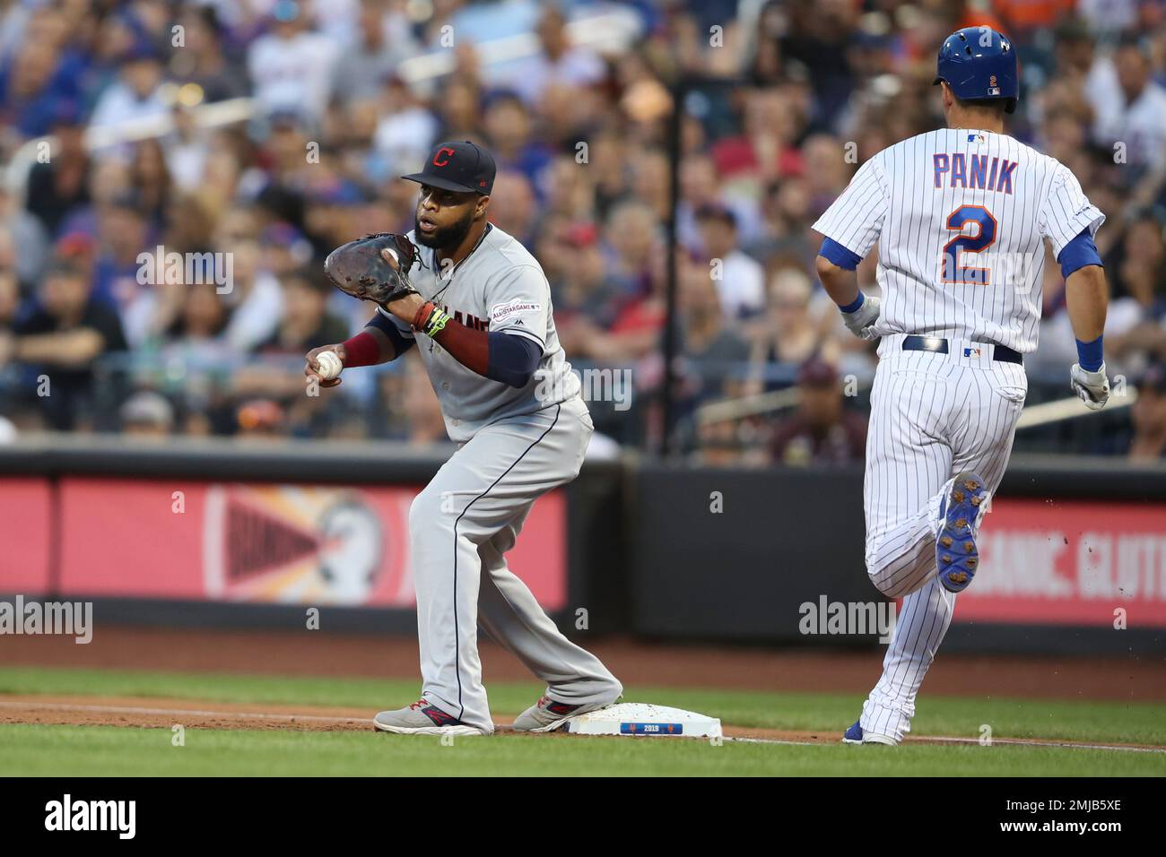 Cleveland Indians first baseman Carlos Santana puts out New York Mets ...