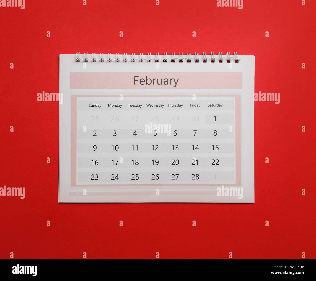 February calendar on red background, top view Stock Photo - Alamy
