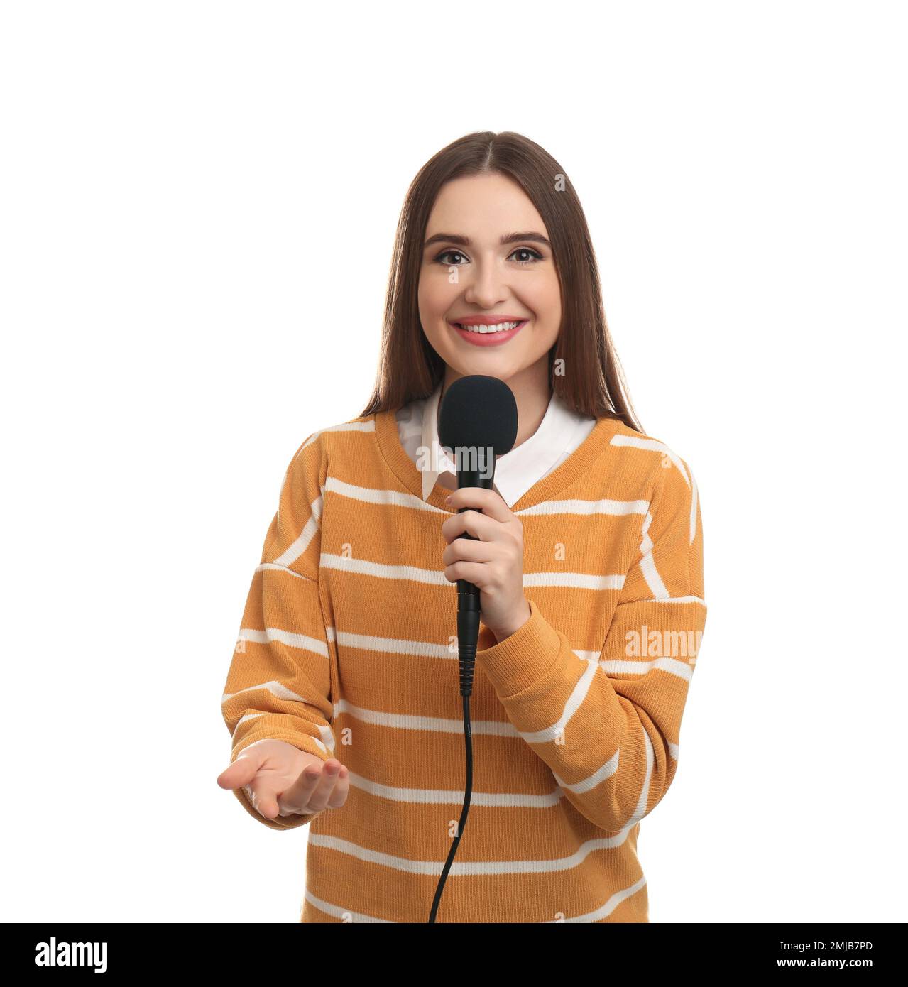 Young female journalist with microphone on white background Stock Photo ...