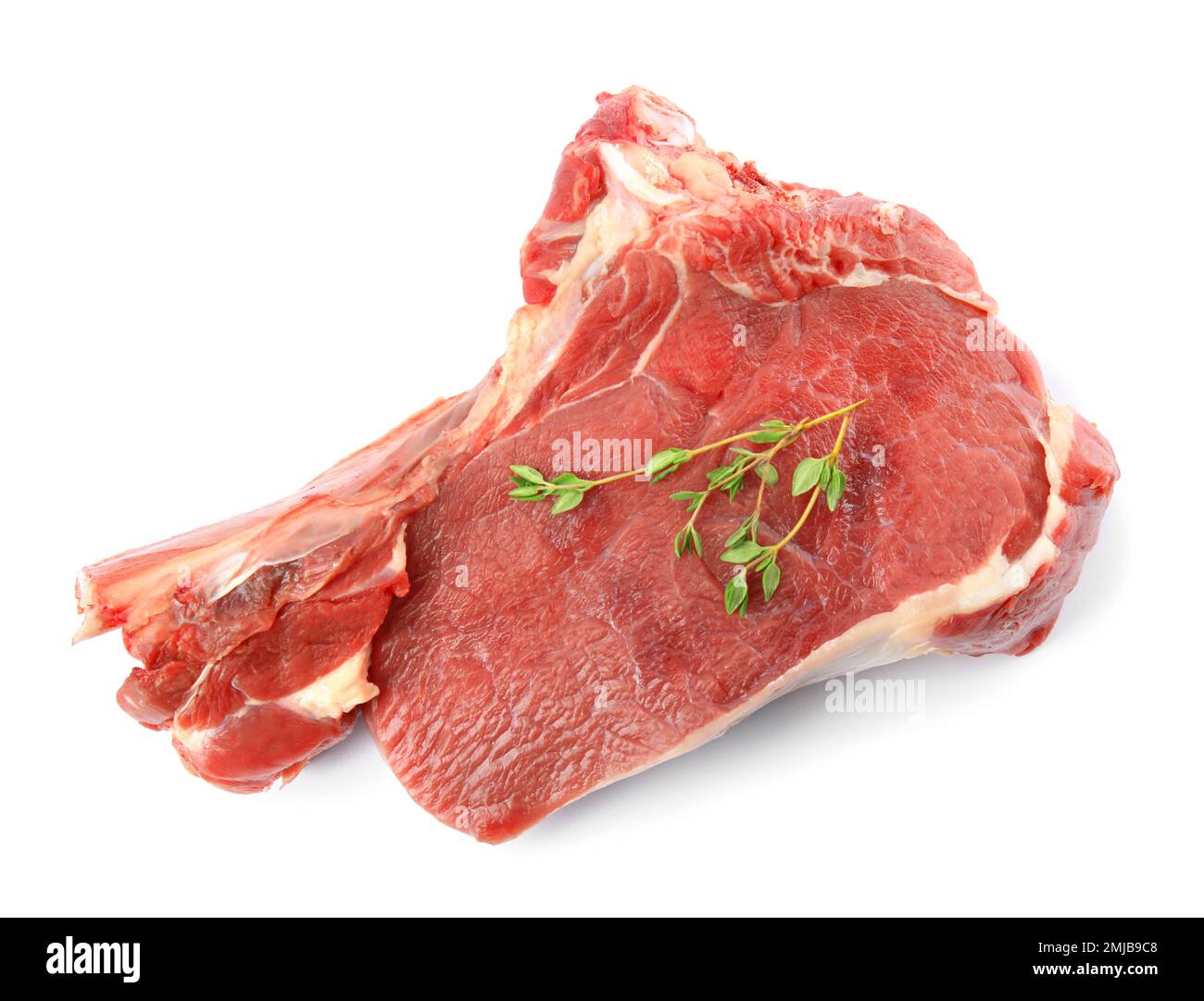 Fresh raw beef cut with thyme isolated on white, top view Stock Photo ...