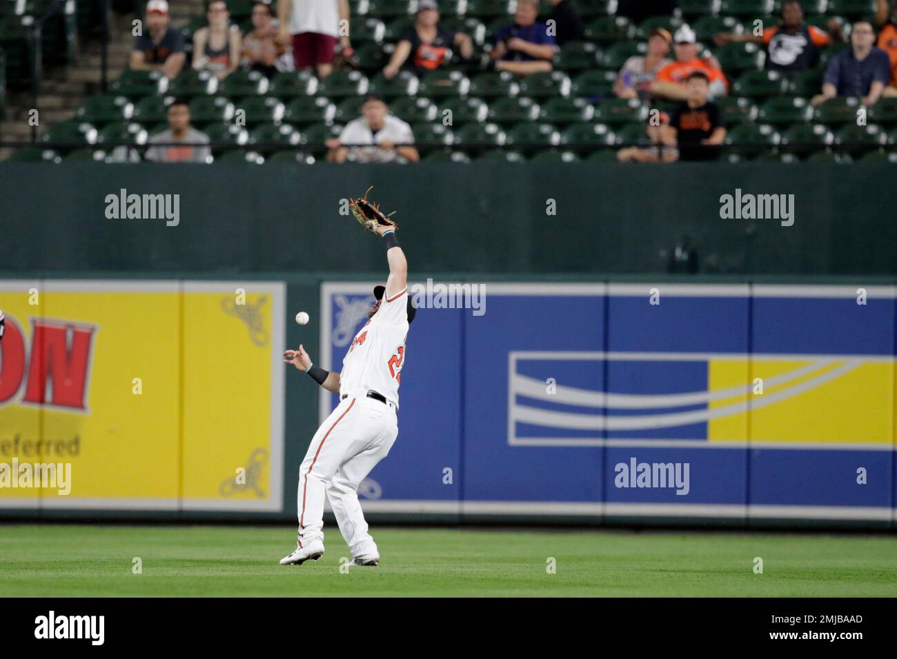 Baltimore Orioles right fielder DJ Stewart drops a fly ball hit by ...