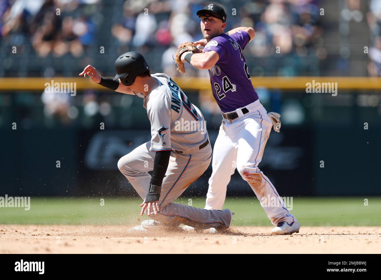 Miami Marlins third baseman Brian Anderson (15) and Colorado Rockies ...