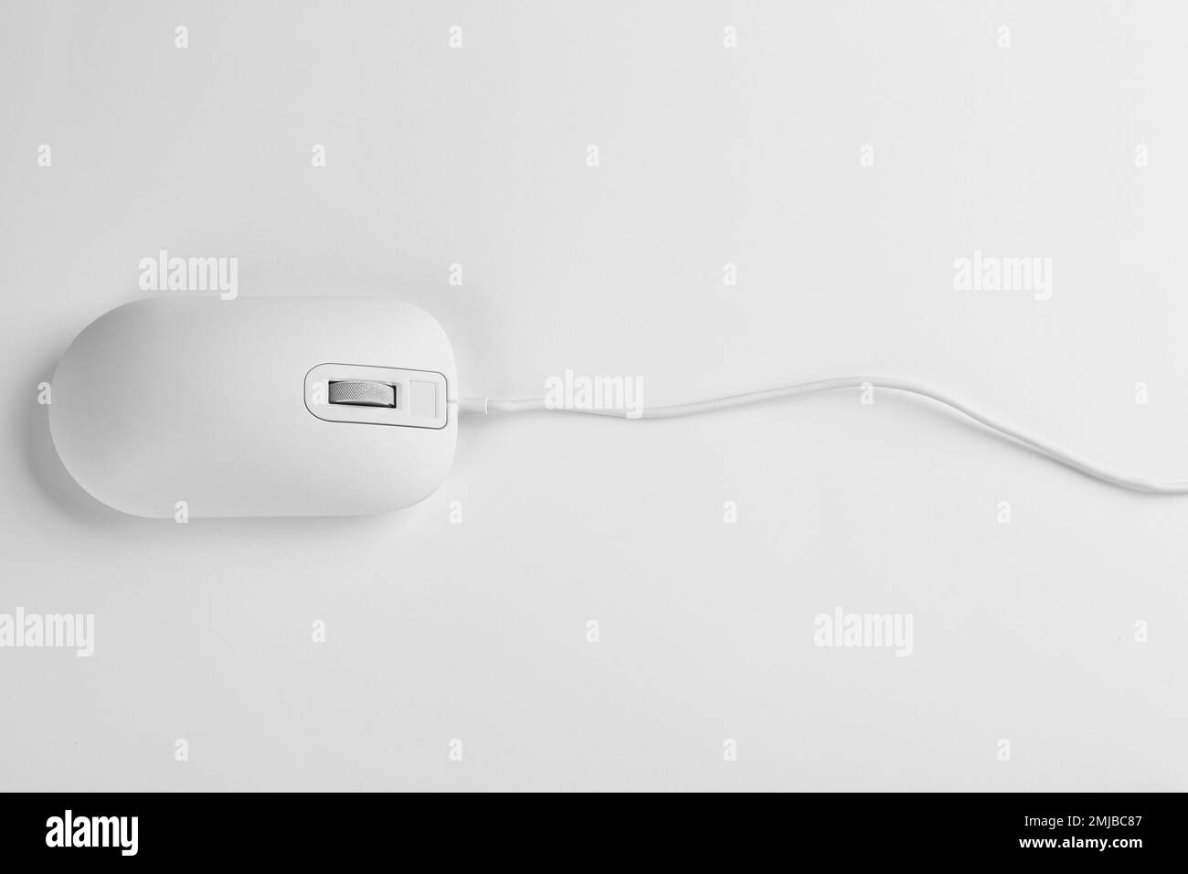 Modern wired optical mouse on white background, top view Stock Photo ...