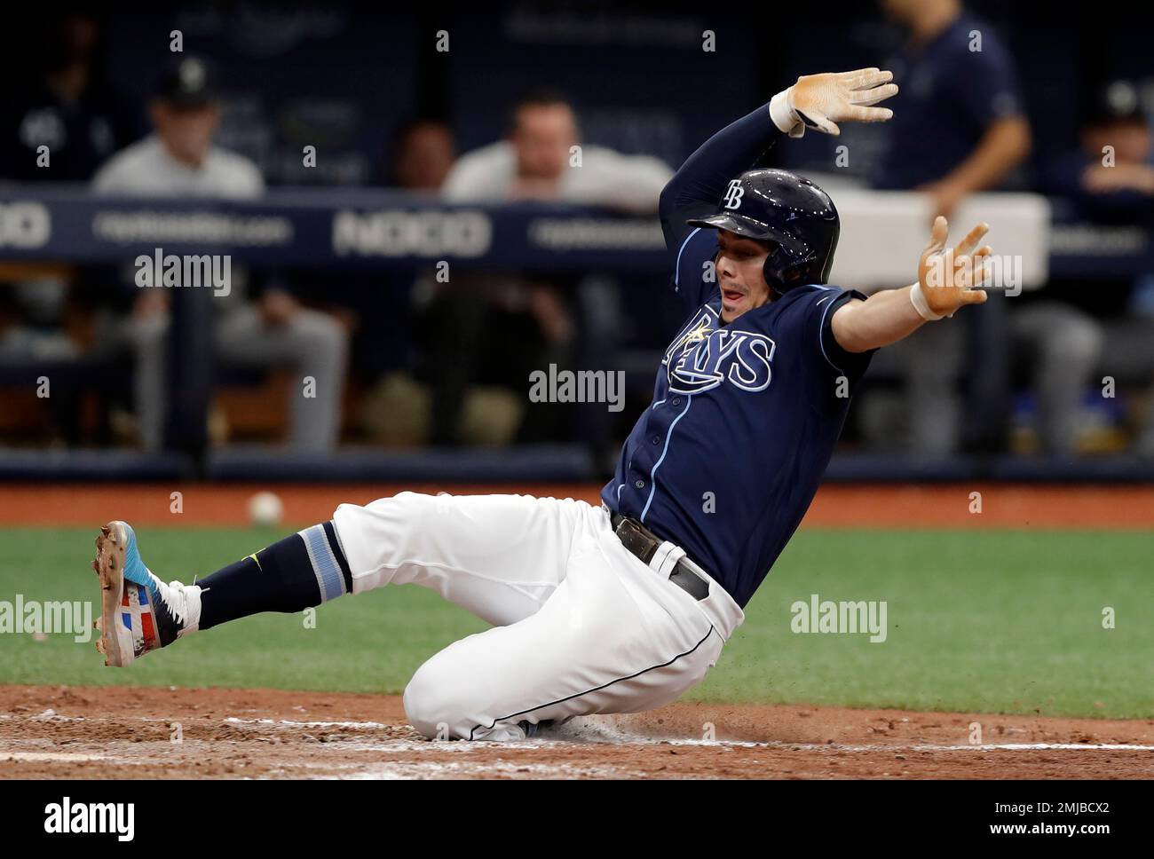 Tampa Bay Rays' Willy Adames scores the game-winning run on a wild ...