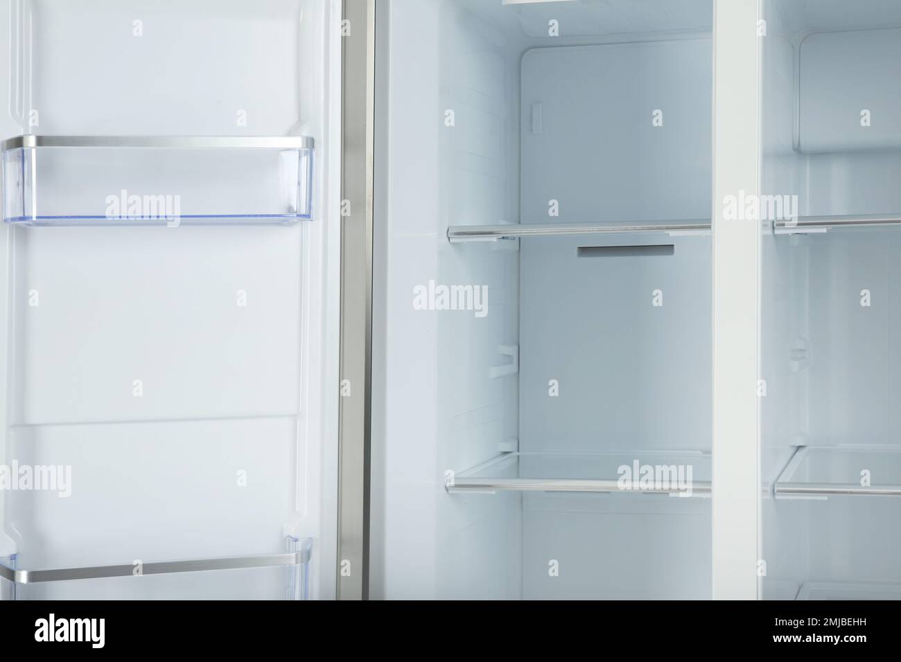 Shelves of empty modern refrigerator, closeup view Stock Photo - Alamy