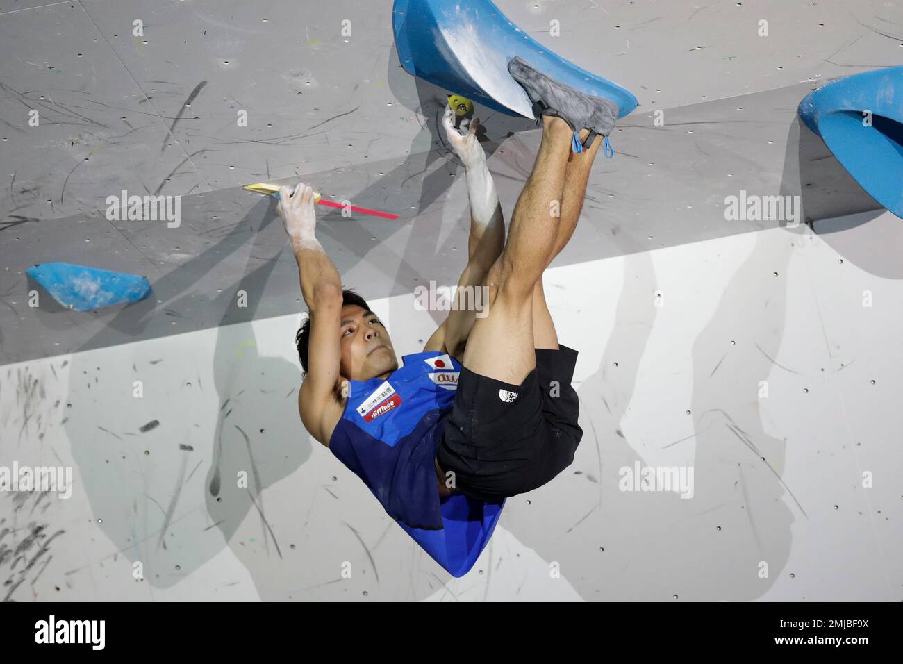 Tomoa Narasaki, of Japan, competes during the men's combined bouldering ...