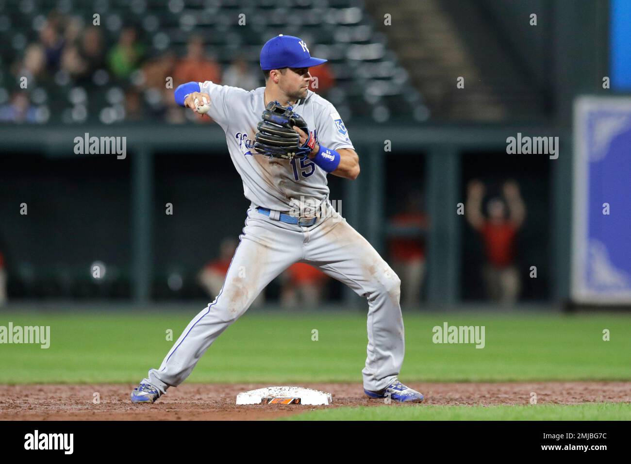 Kansas City Royals second baseman Whit Merrifield turns a double play ...