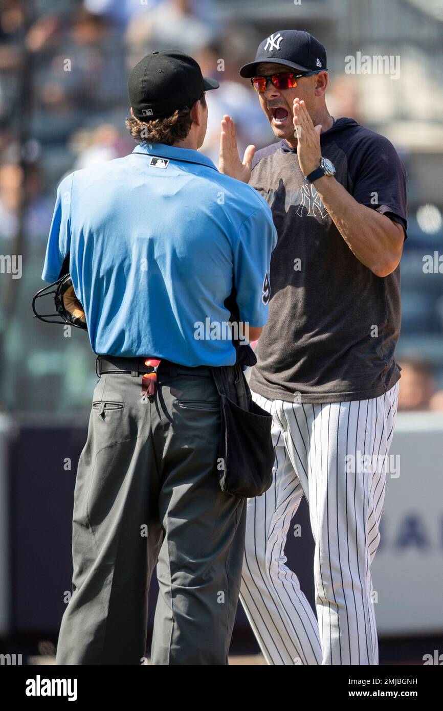 New York Yankees manager Aaron Boone, right, argues with Home plate ...