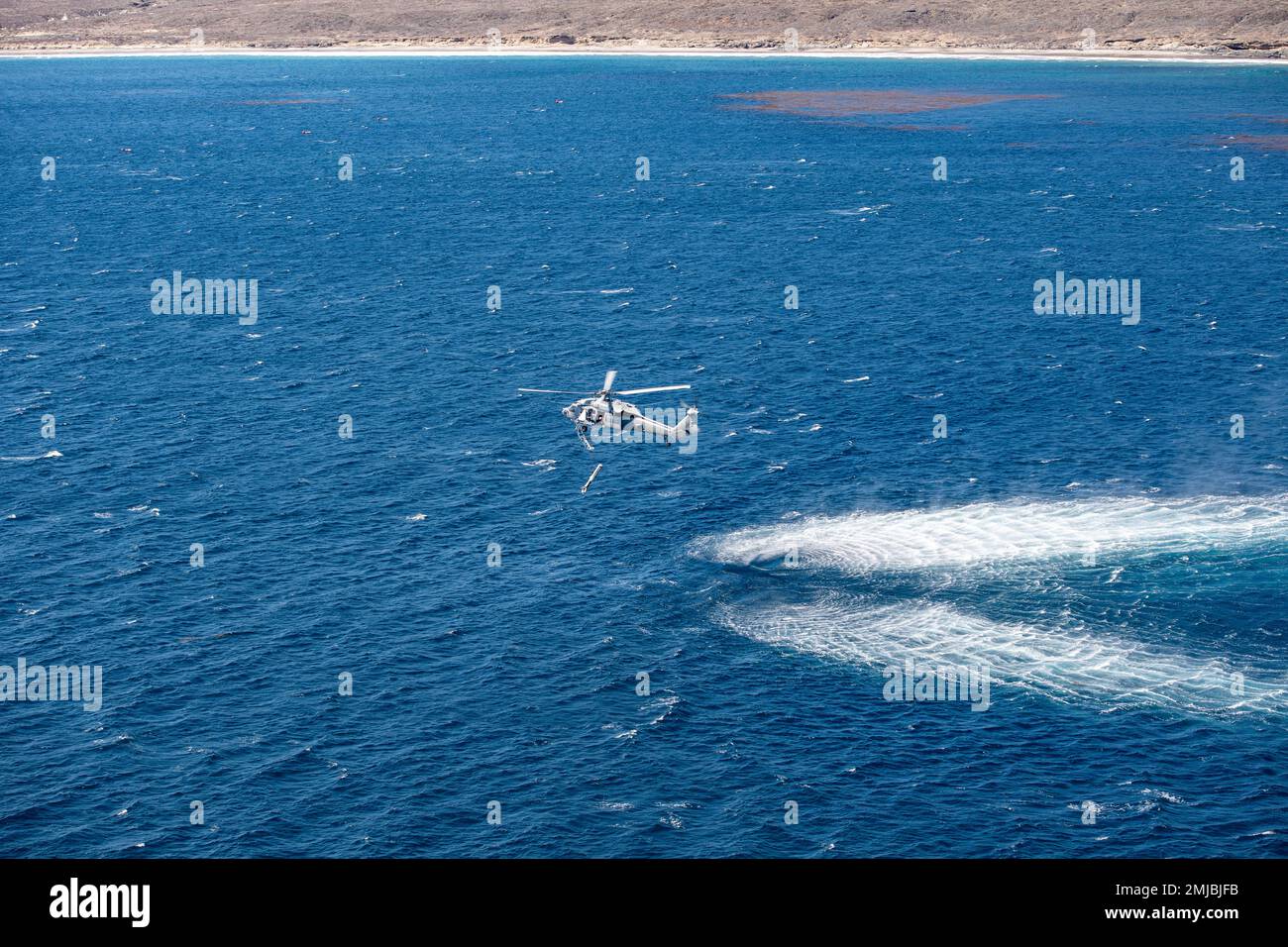 An MH-60S Sea Hawk attached to Helicopter Sea Combat Squadron (HSC) 21 ...