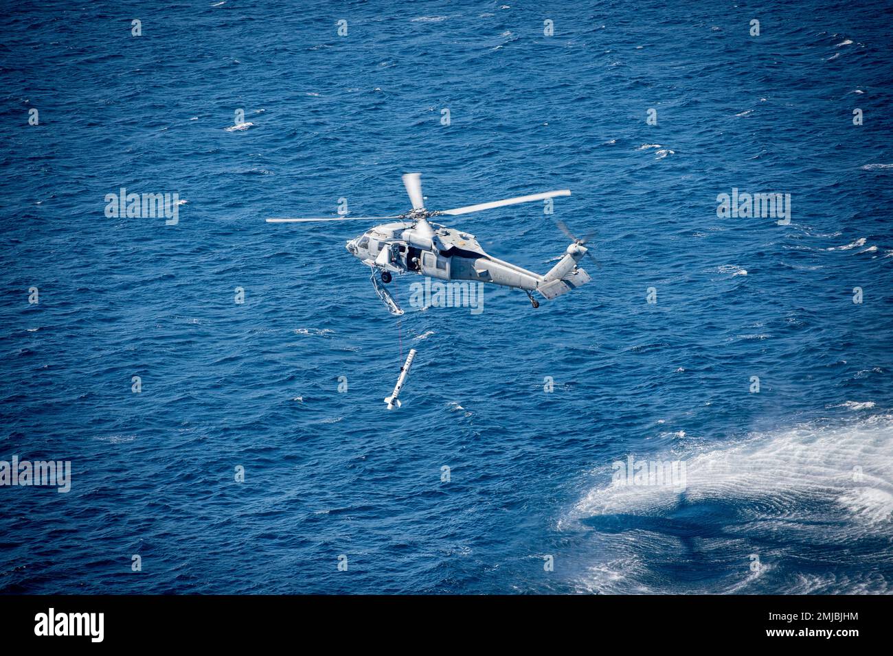 An MH-60S Sea Hawk attached to Helicopter Sea Combat Squadron (HSC) 21 ...