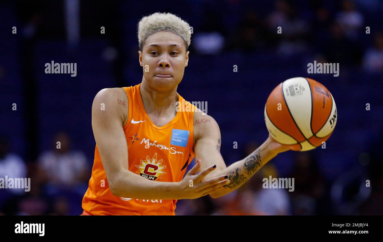 Connecticut Sun guard Natisha Hiedeman passes the ball to a teammate ...