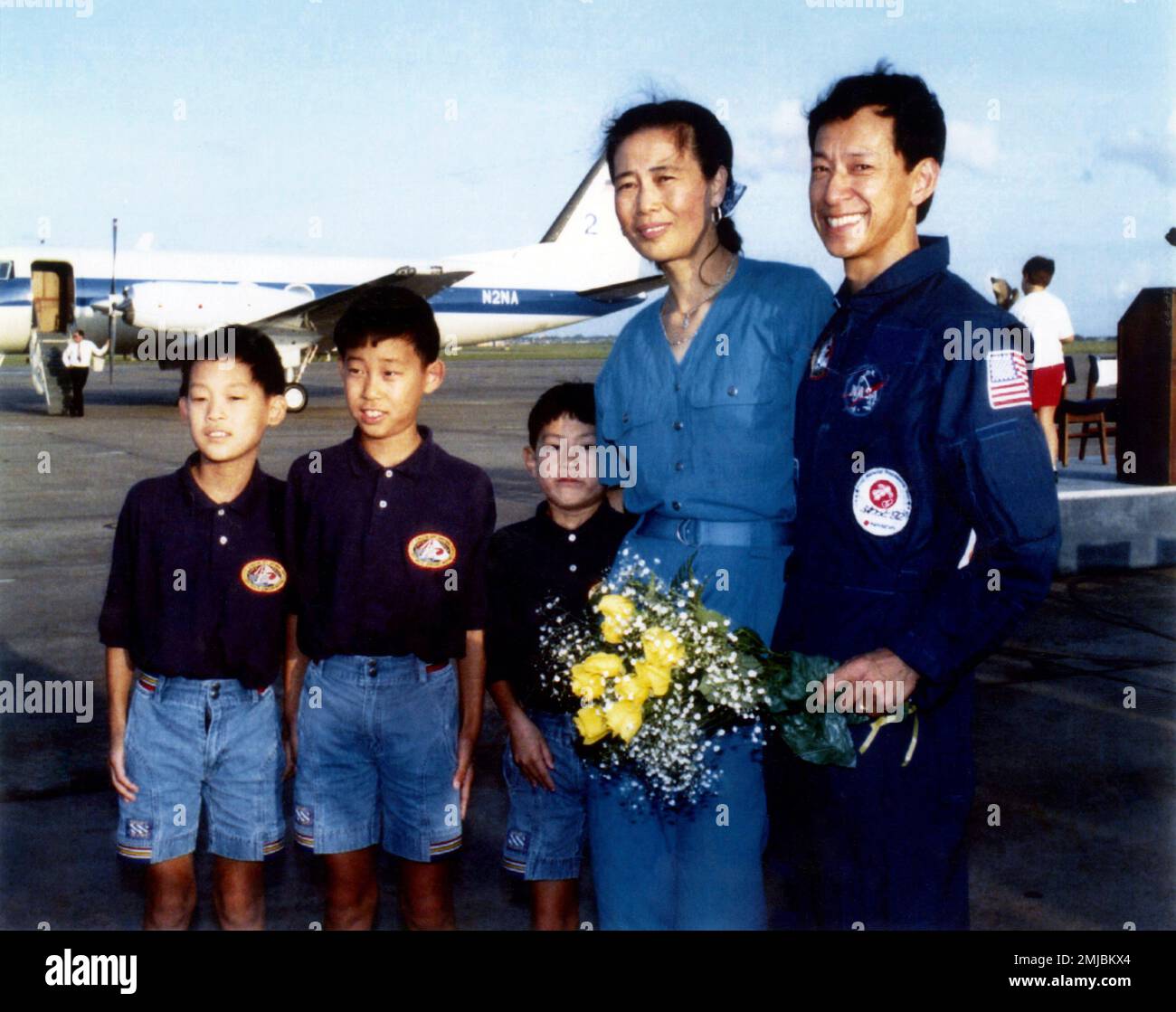Japanese astronaut Mamoru Mohri, right, poses with his family at ...