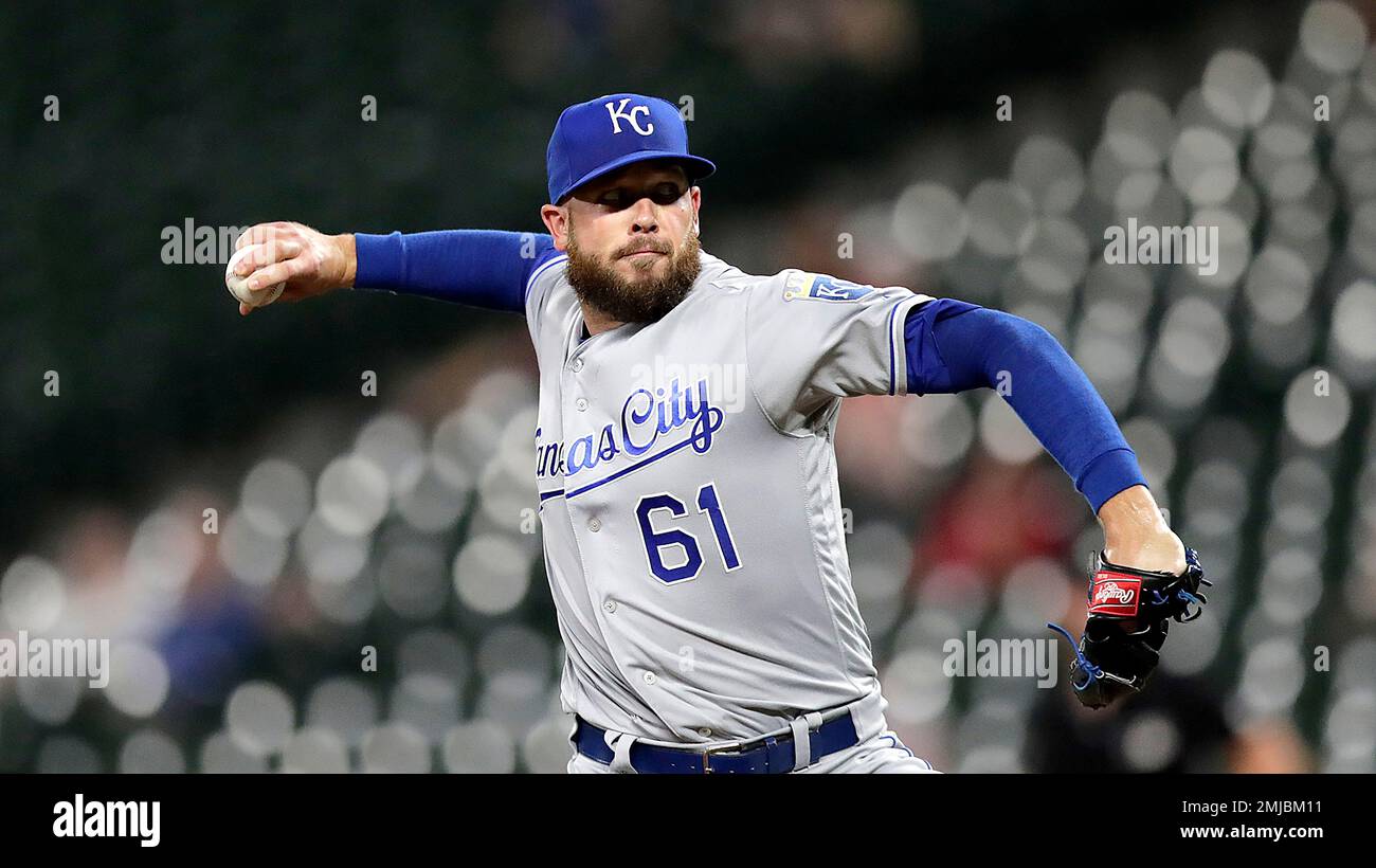 Kansas City Royals relief pitcher Kevin McCarthy throws a pitch to a ...