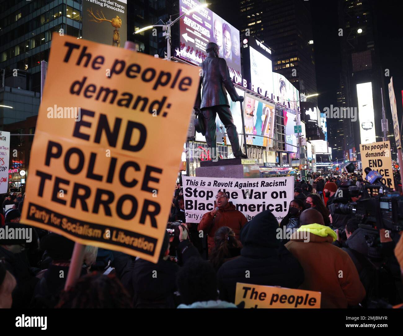 New York, United States. 26th Jan, 2023. People gather and hold signs ...