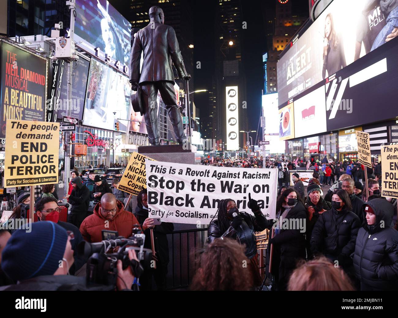 New York, United States. 26th Jan, 2023. People gather and hold signs ...