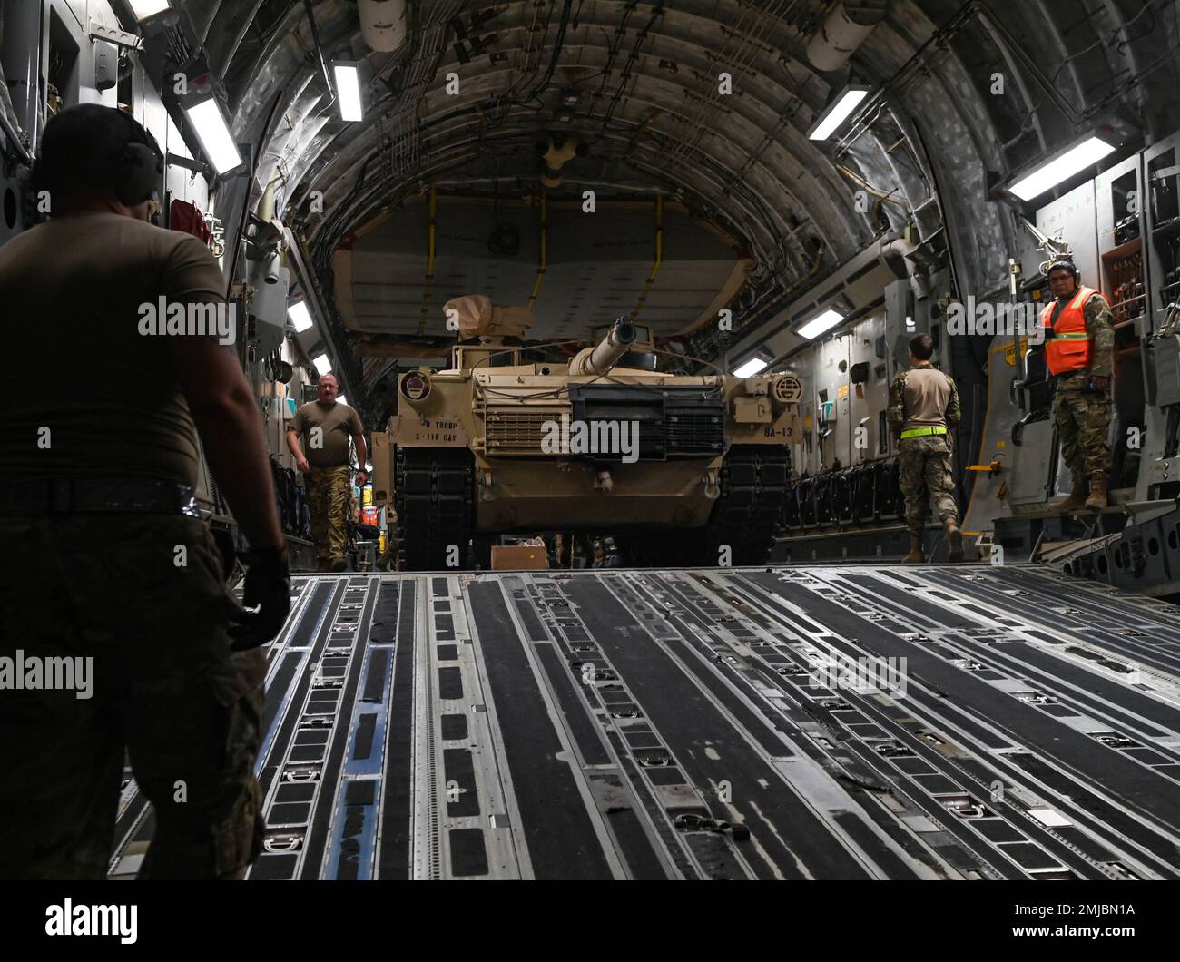 An M-1/A2 Abrams main battle tank is loaded onto an 816th Expeditionary ...