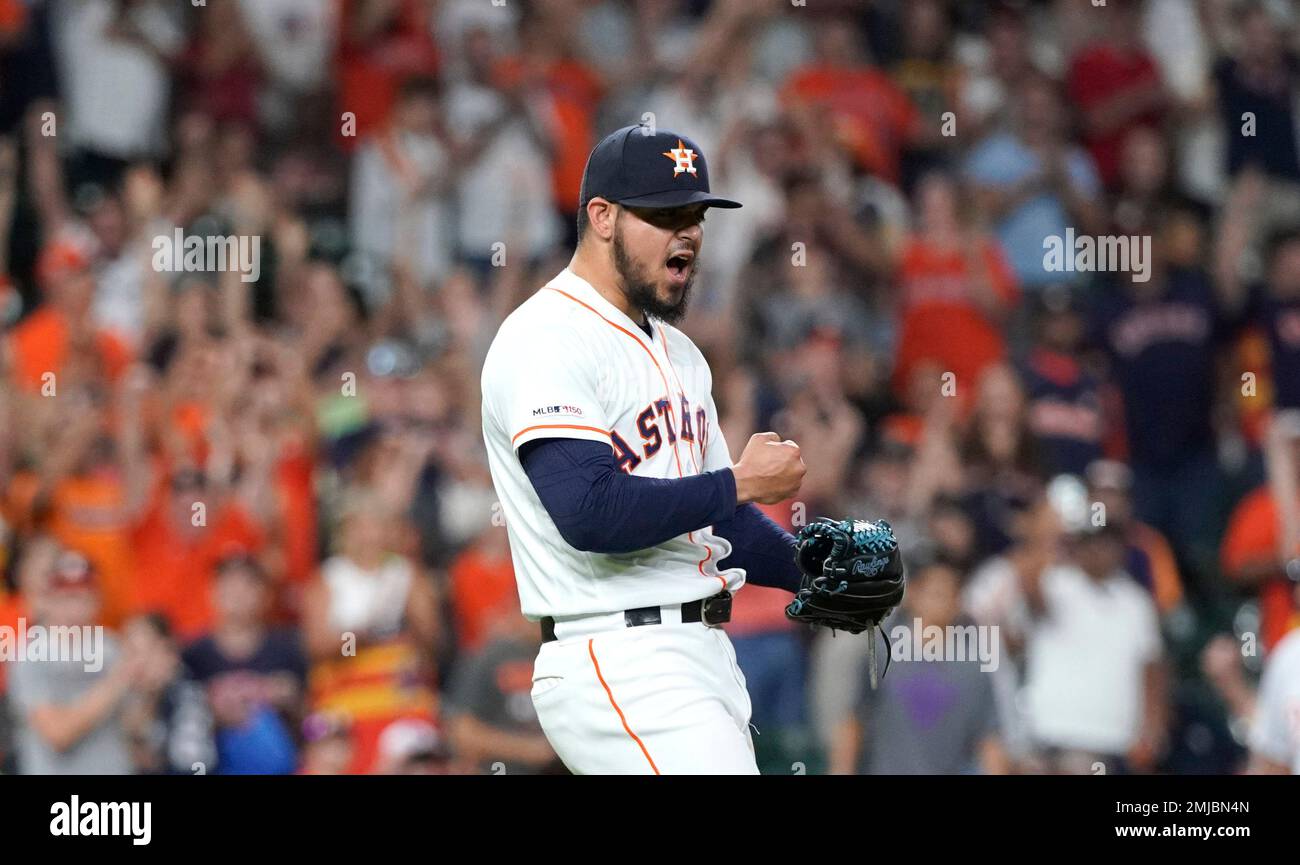 Houston Astros relief pitcher Roberto Osuna reacts after striking out ...