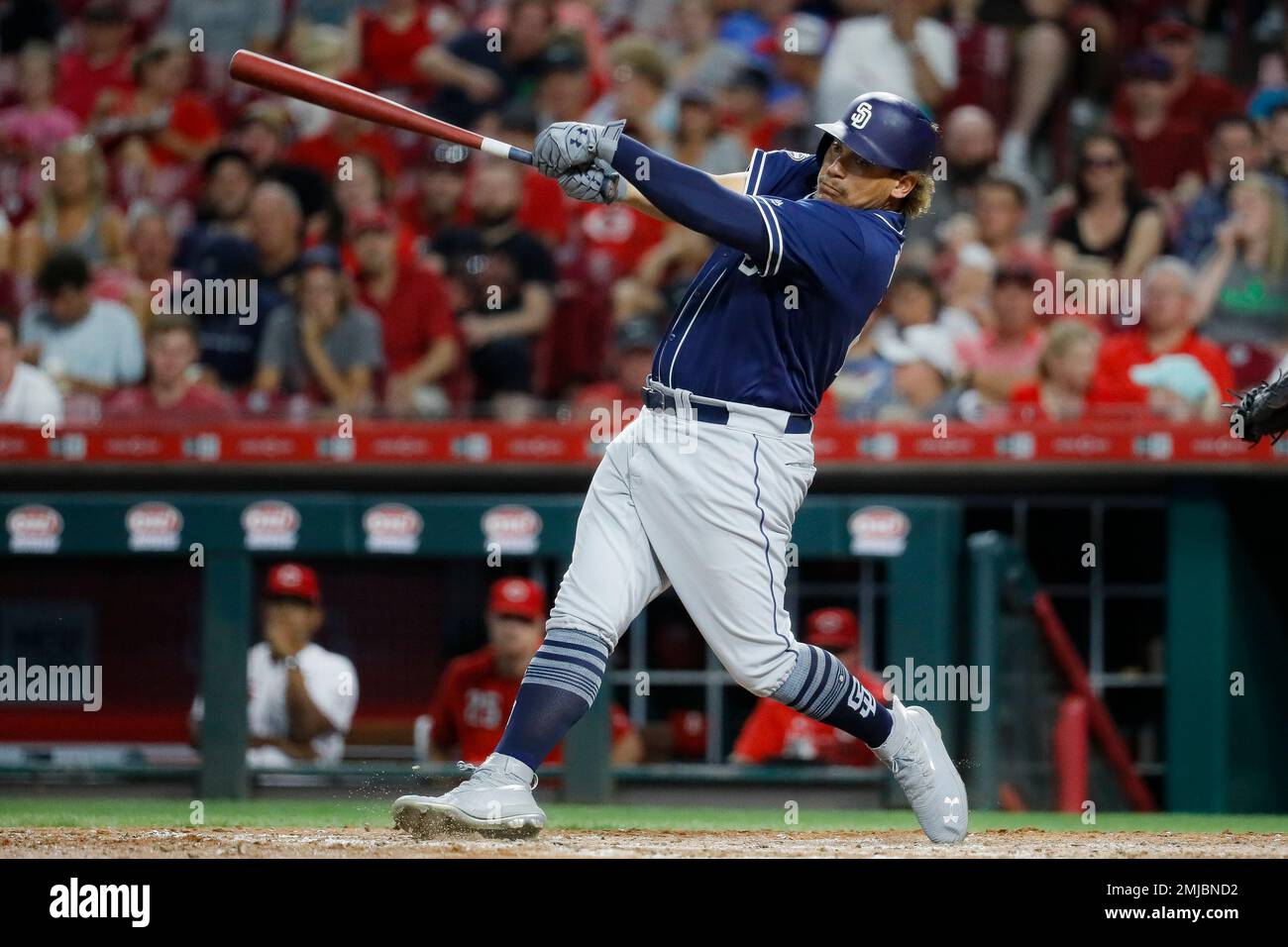 San Diego Padres' Josh Naylor hits a fly ball and reaches second on a ...