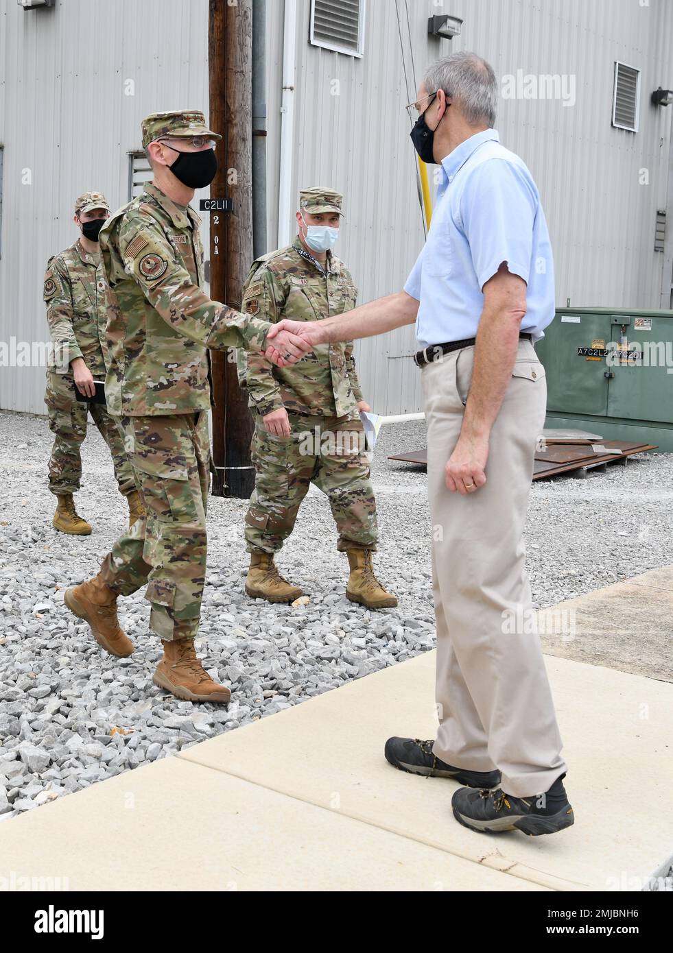 Gen. Duke Z. Richardson, commander, Air Force Materiel Command, shakes ...