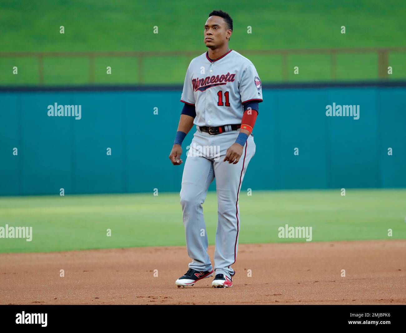 Minnesota Twins' Jorge Polanco (11) walks to the dugout during a ...
