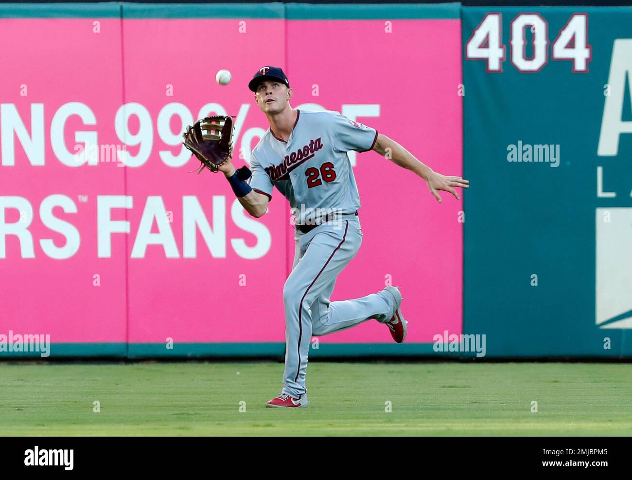 Minnesota Twins' Max Kepler fields a fly out by the Texas Rangers ...