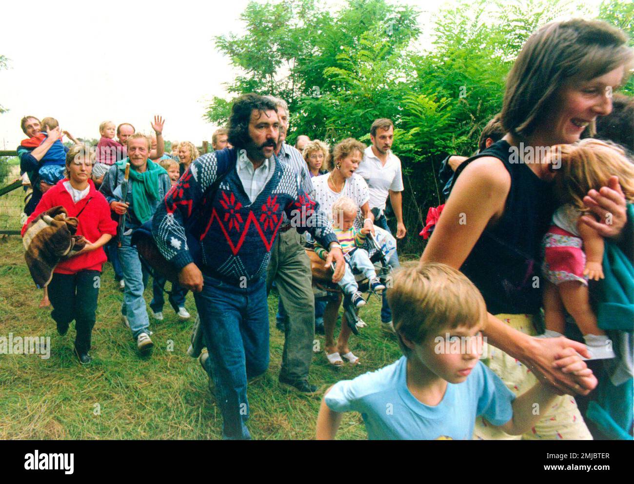 File---Picture taken Aug.19, 1989 shows East Germans surprise Hungarian ...
