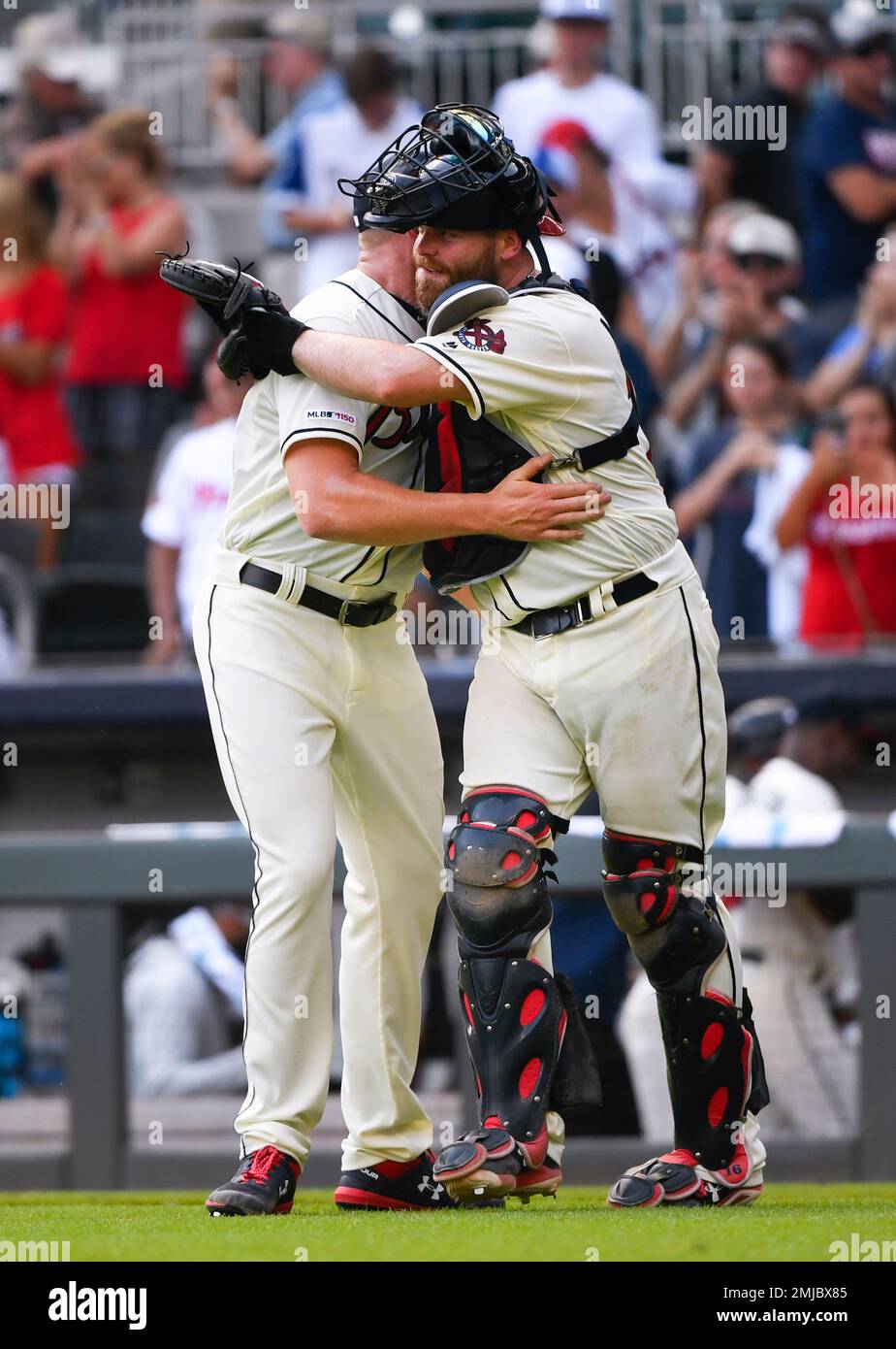 Atlanta Braves pitcher Mark Melancon, left, and catcher Brian McCann ...