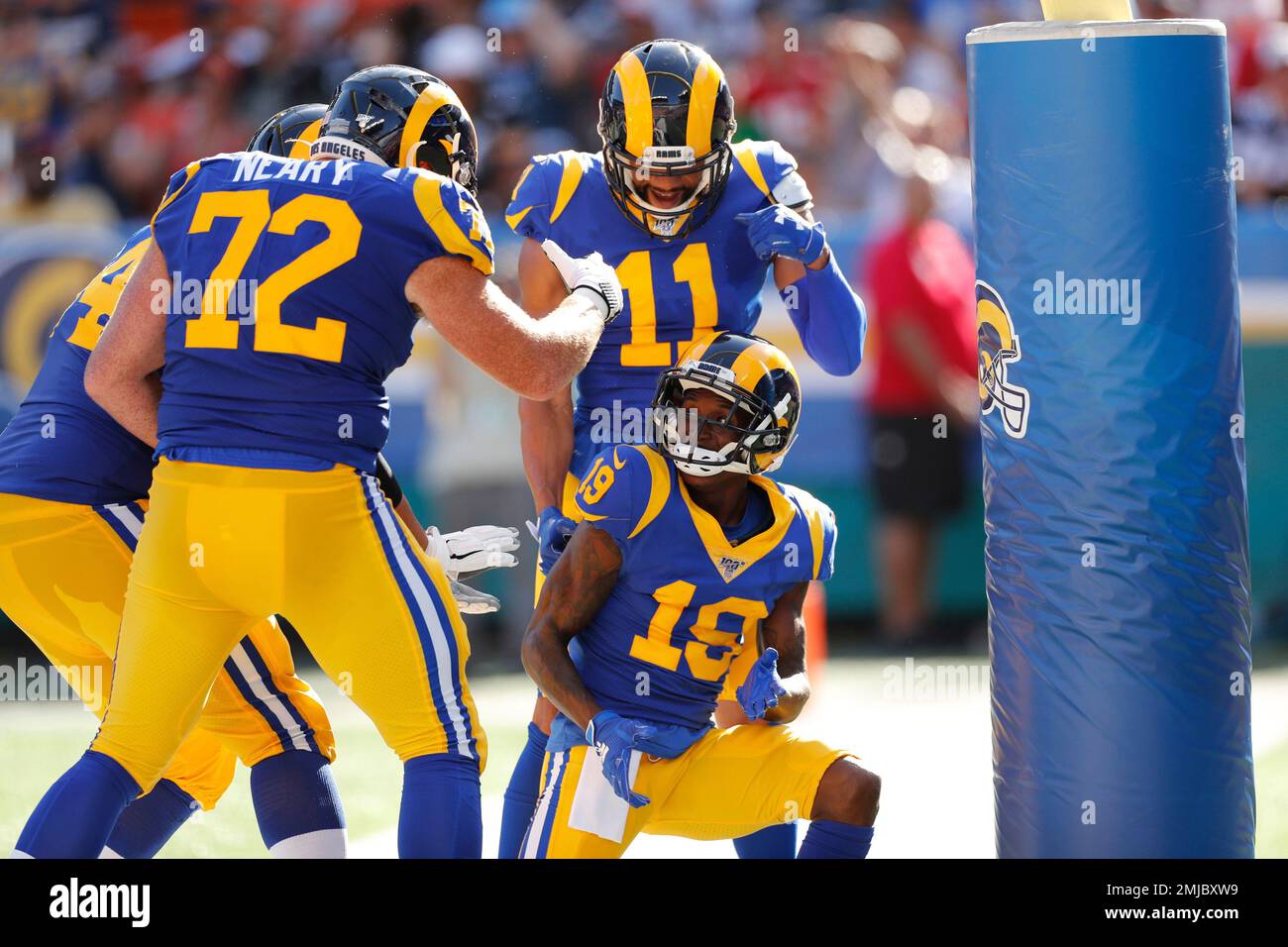 Los Angeles Rams wide receiver JoJo Natson (19) celebrates with center ...