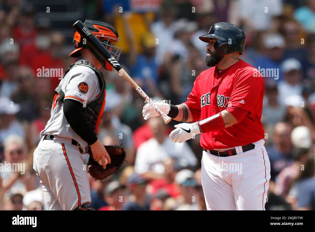 Boston Red Sox's Sandy Leon, right, tosses his bat beside Baltimore ...