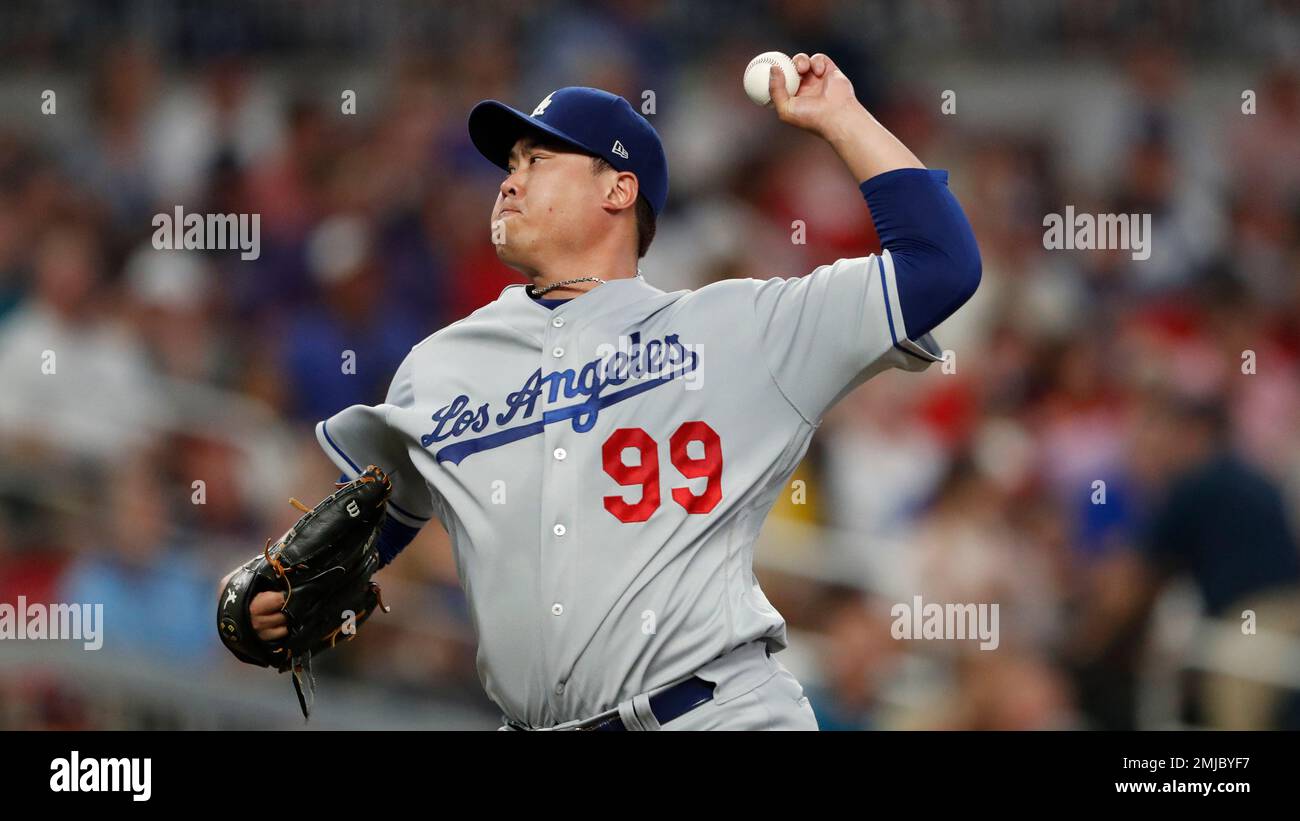 Los Angeles Dodgers starting pitcher Hyun-Jin Ryu (99) works in the ...