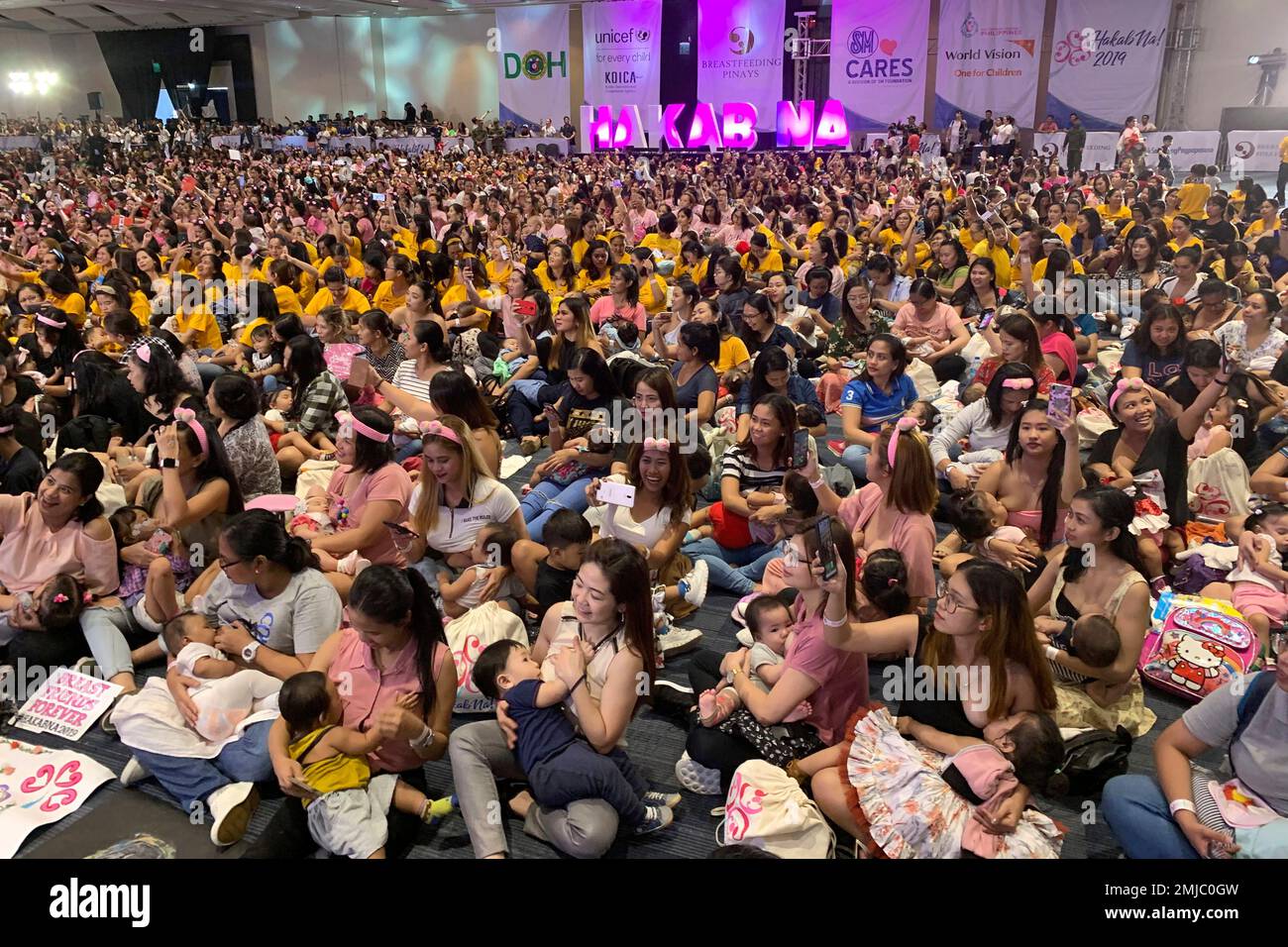 More than 2,000 Filipino mothers with their babies participate in a ...