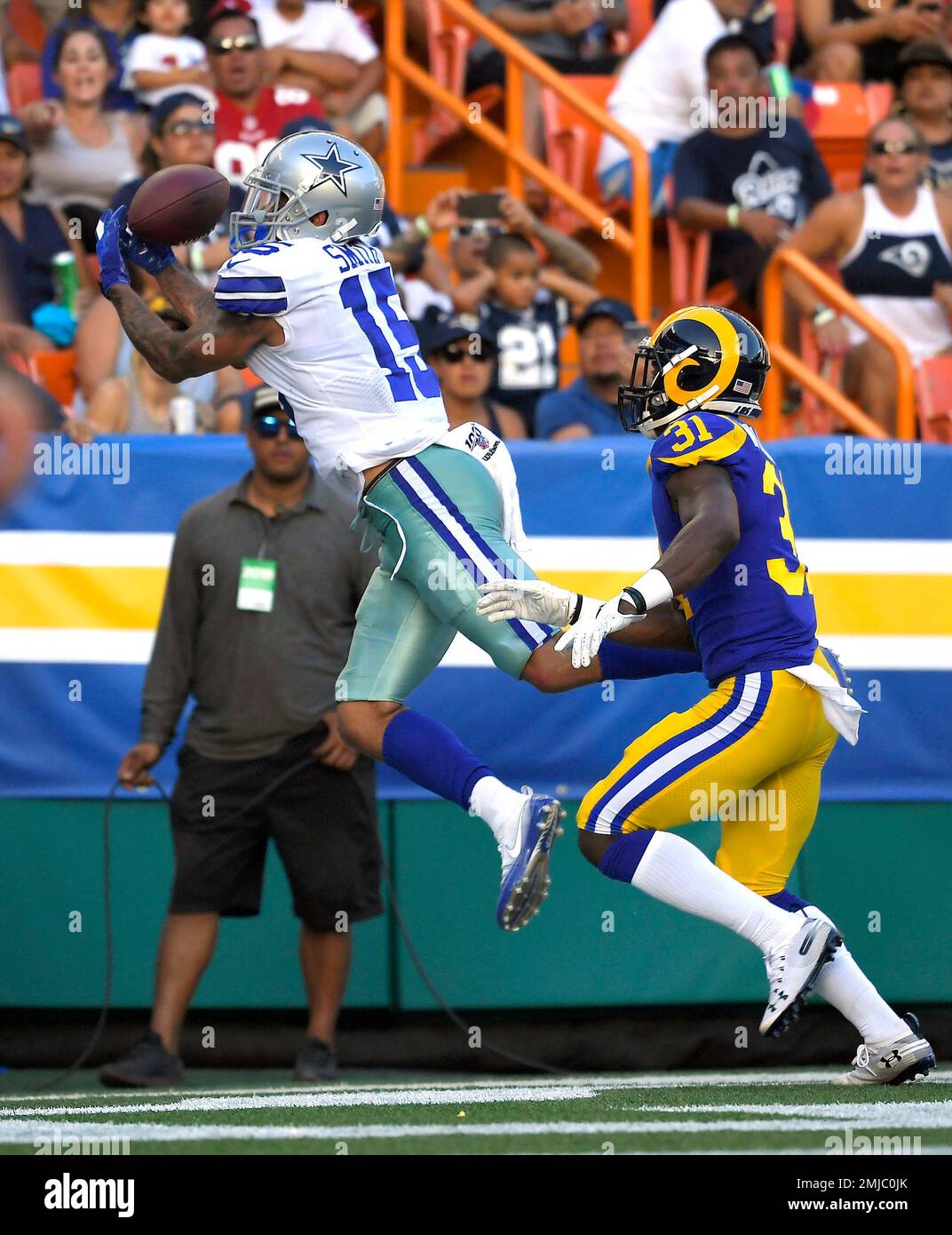 Dallas Cowboys wide receiver Devin Smith, left, makes a touchdown catch ...