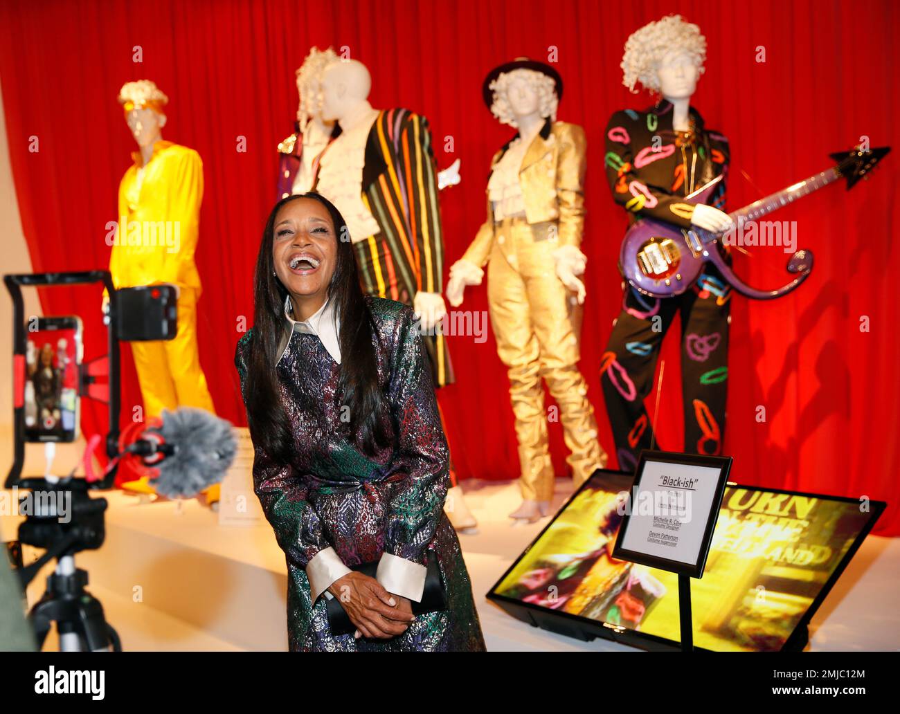 Michelle R. Cole is pictured with her Emmy-nominated costume design ...