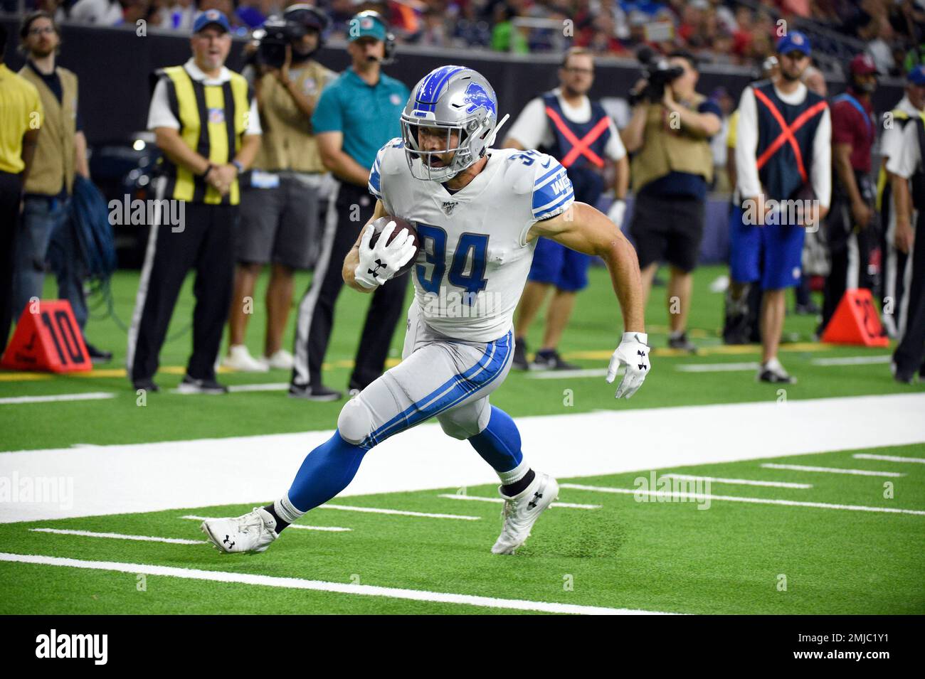 Detroit Lions running back Zach Zenner (34) scores a touchdown after ...