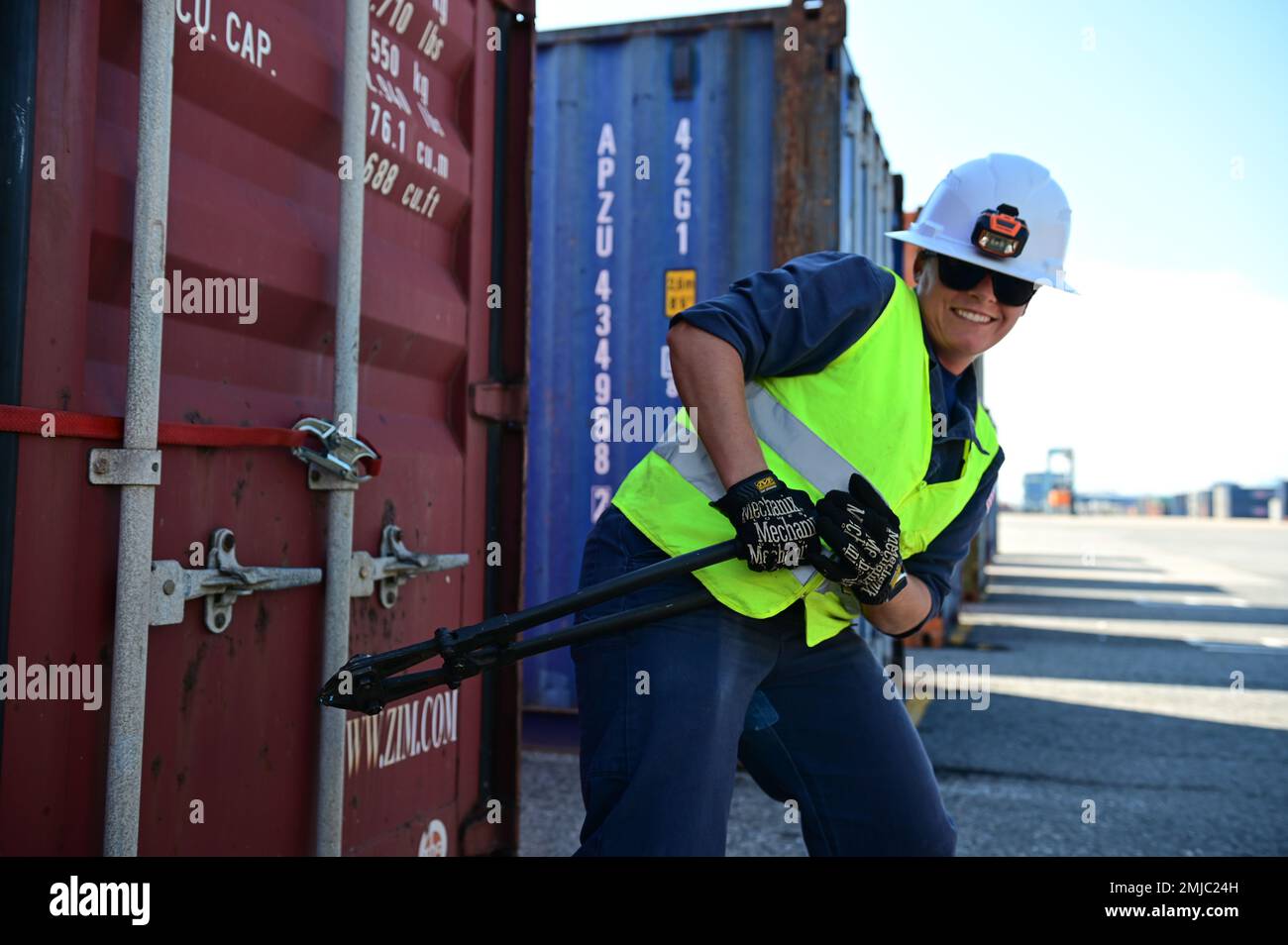 Petty Officer 2nd Class Reeves, Sector Virginia Prevention, cuts a ...
