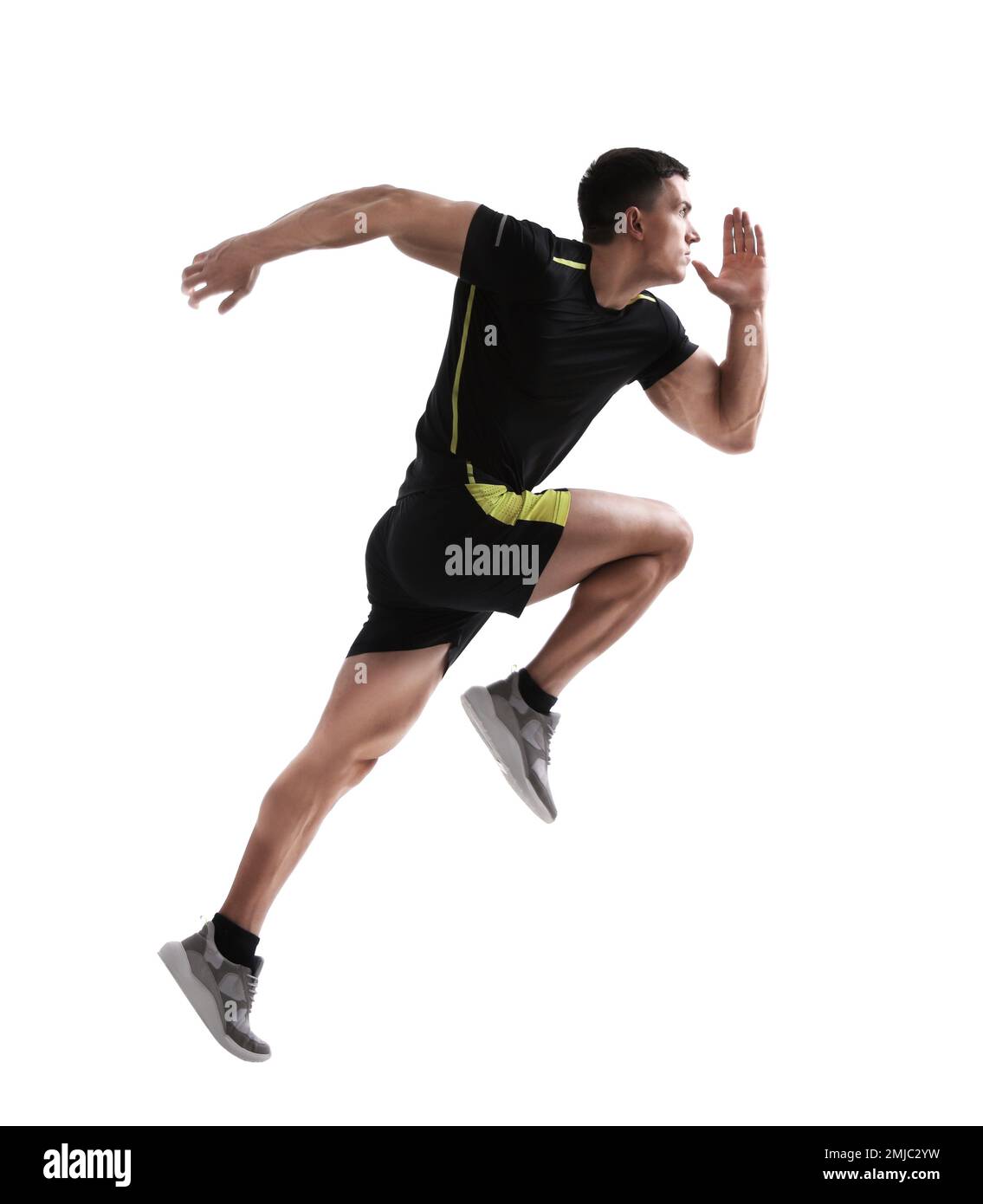 Athletic young man running on white background, side view Stock Photo ...